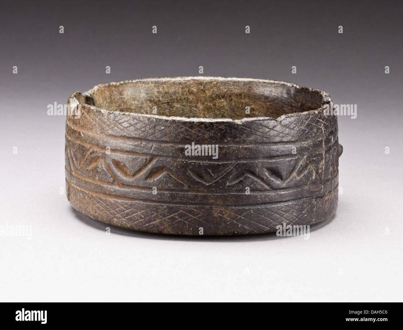 This cylindrical bowl is an example of ceramic craftsmanship ...