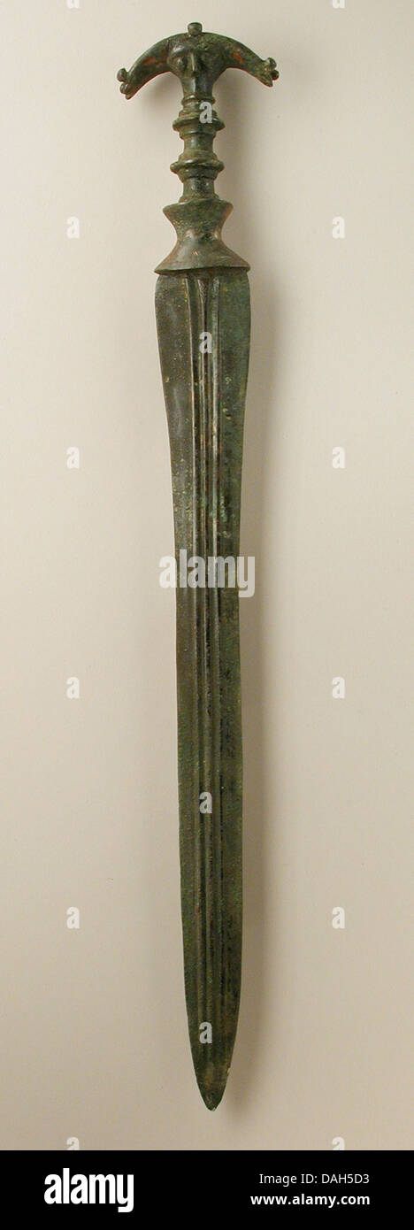 This dagger, crafted from bronze, is an example of ancient weaponry ...