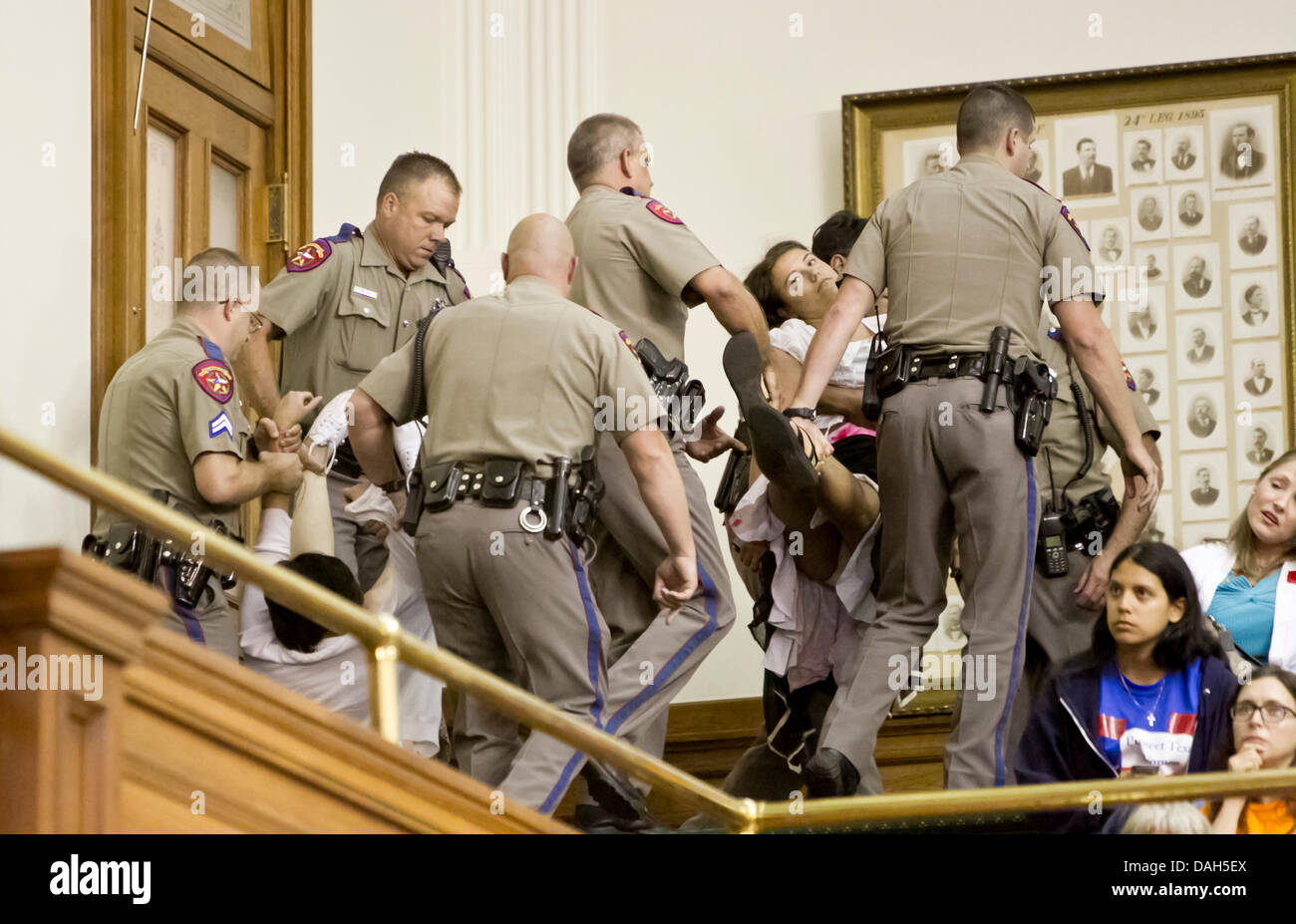 Texas Department of Public Safety state troopers remove two women from ...