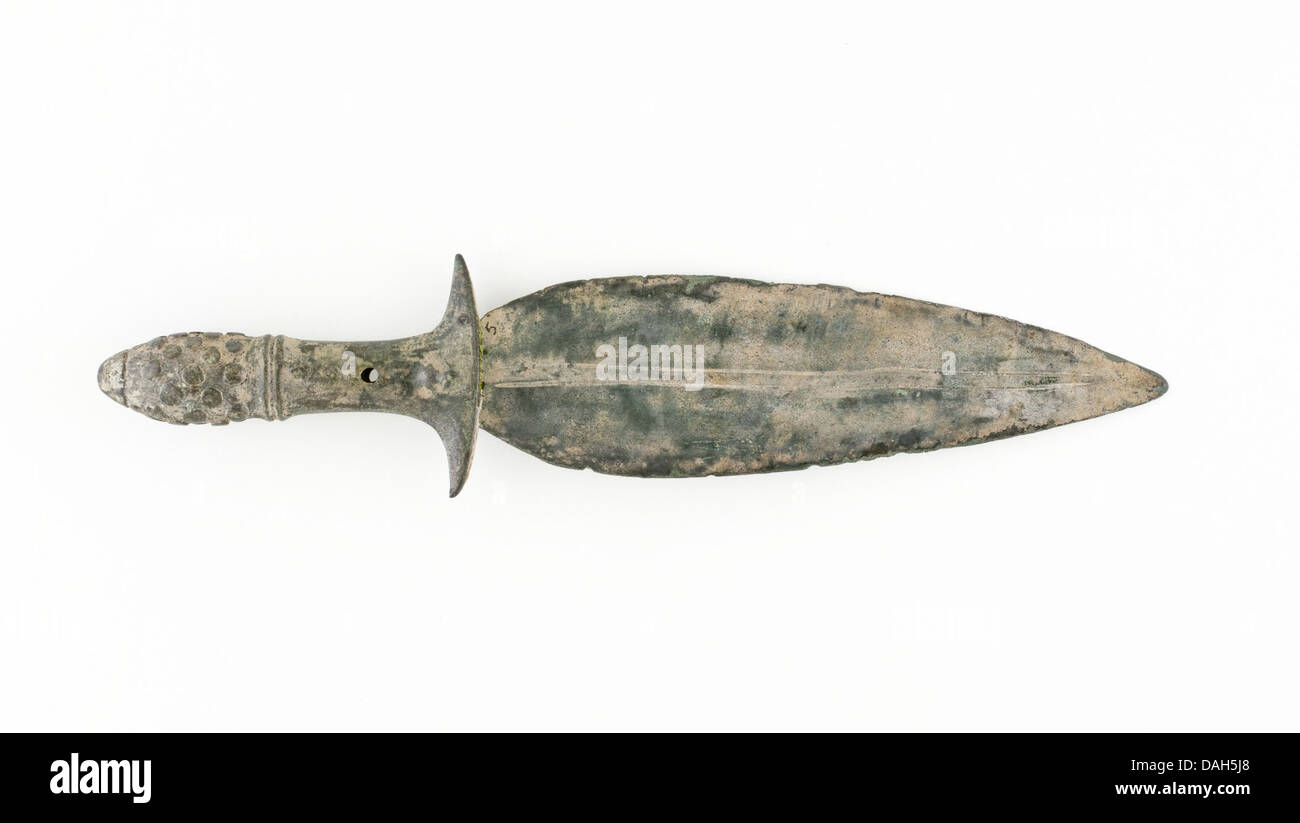This bronze dagger features a finely cast blade and a detailed hilt ...