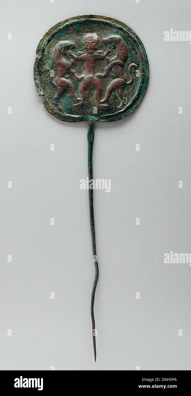 The disc-headed pin, part of LACMA’s collection, is a bronze object ...