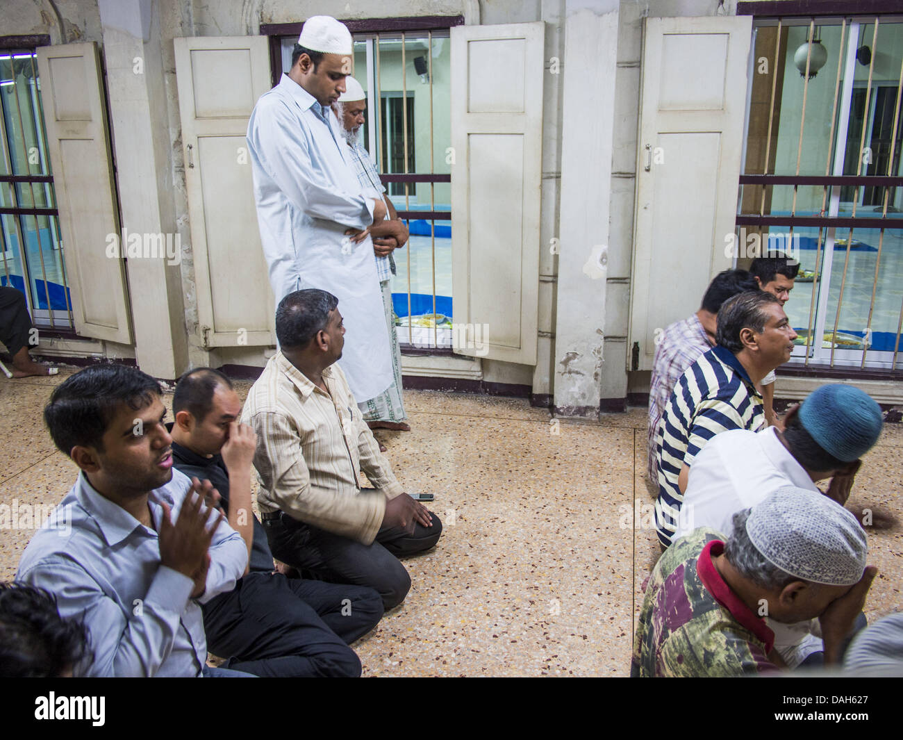 July 13, 2013 - Bangkok, Thailand - Men pray during Ramadan at Haroon ...