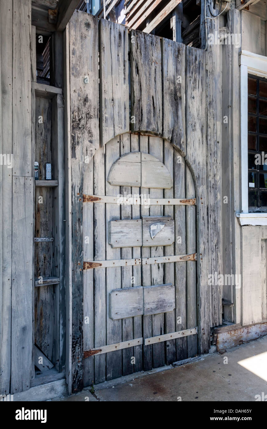 Rustic weathered wooden double doors gate secure alleyway passage ...
