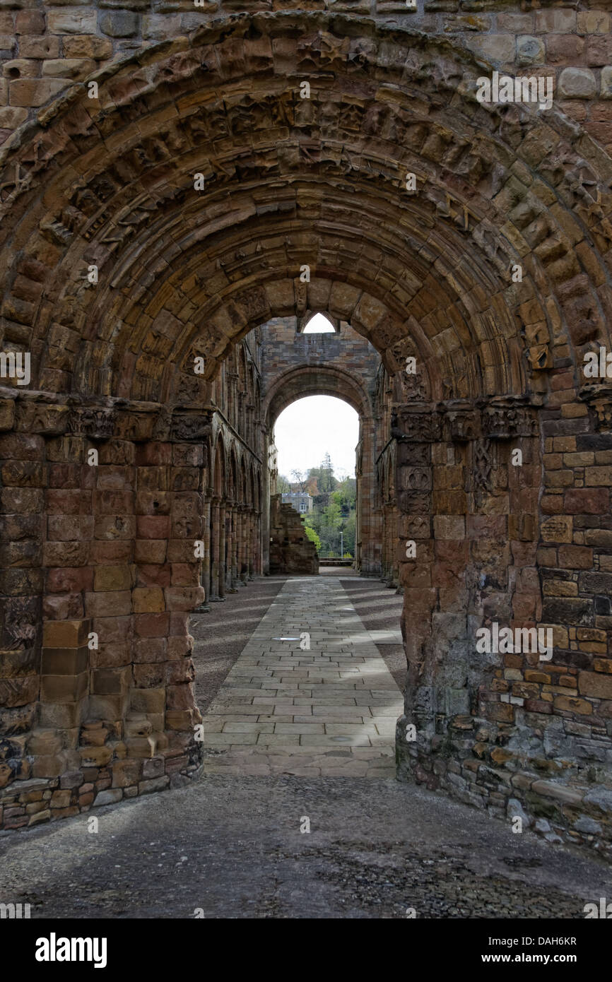 Abbey of St Mary of Jedburgh - Norman archway West entrance Stock Photo ...