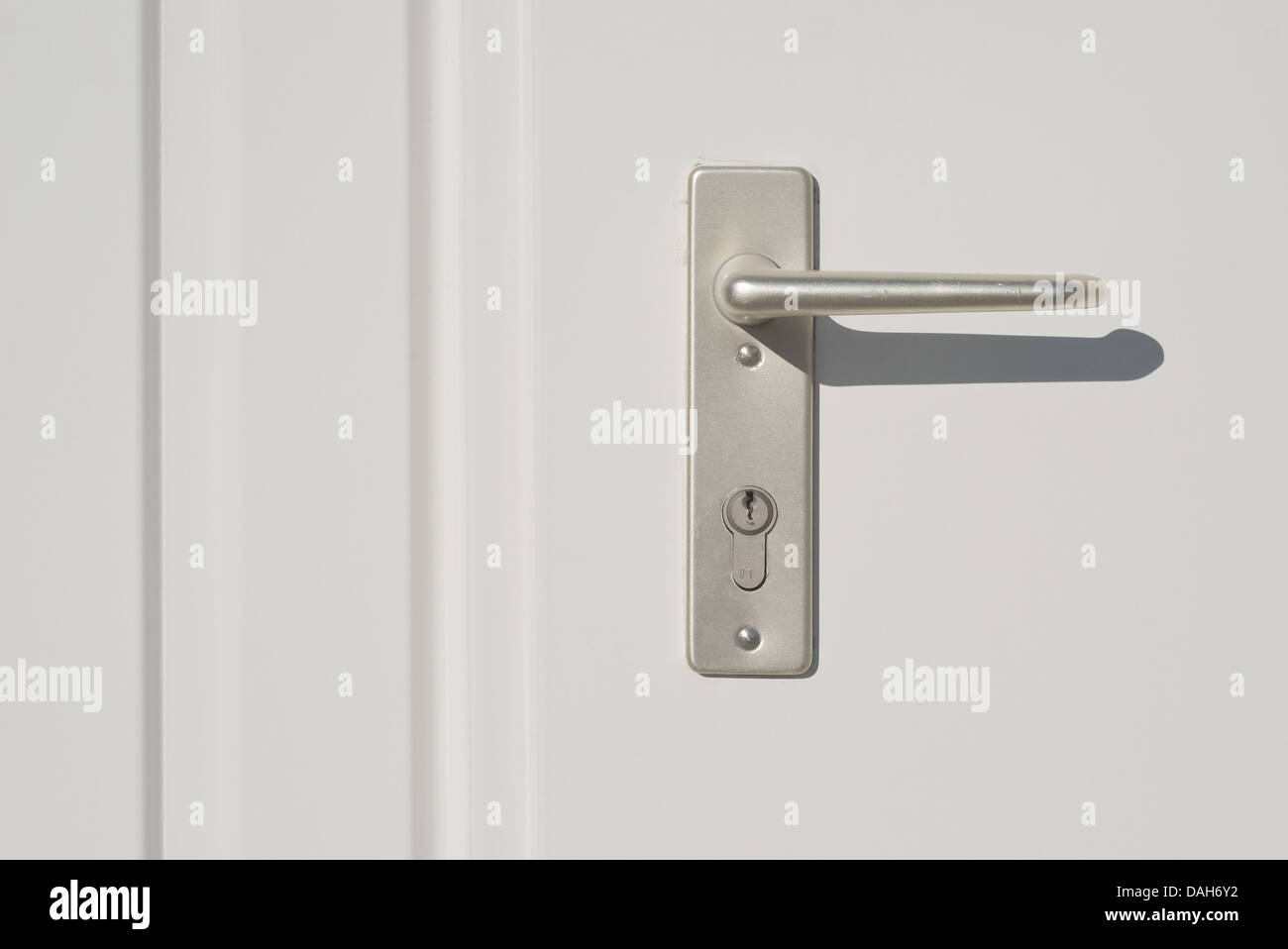 Door Handle on a Metal Construction Office Stock Photo - Alamy