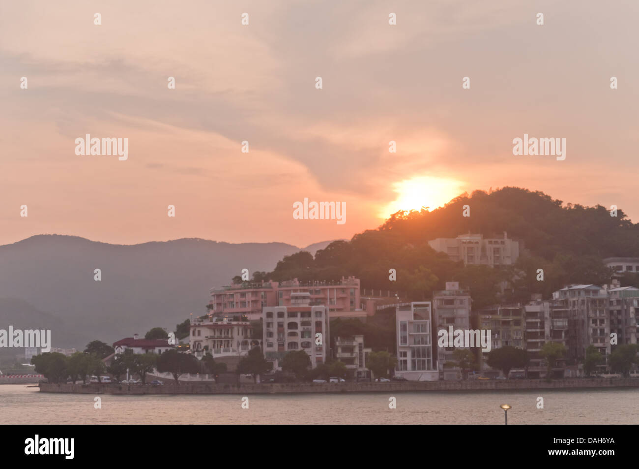 Cityscape in Macao at sunset time Stock Photo - Alamy