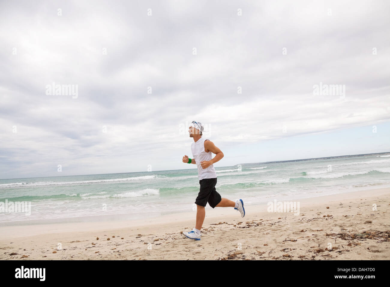 man is jogging on the beach summertime sport fitness run jogger runner ...