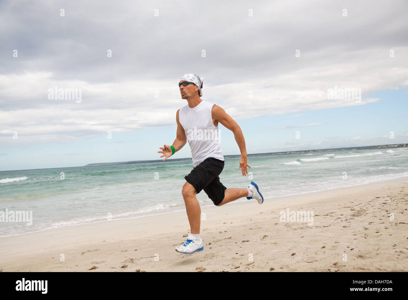 man is jogging on the beach summertime sport fitness run jogger runner ...