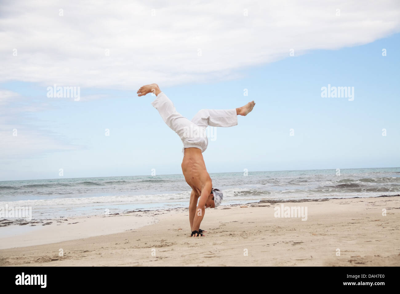 man is jumping sport karate martial arts fight kick jump beach ...