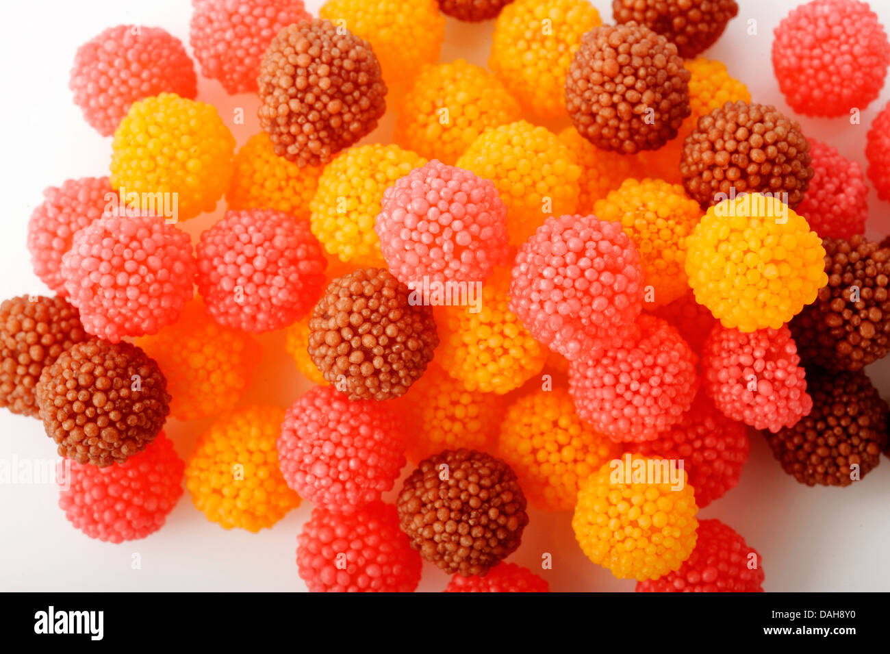 colourful gummy berry on white background Stock Photo - Alamy