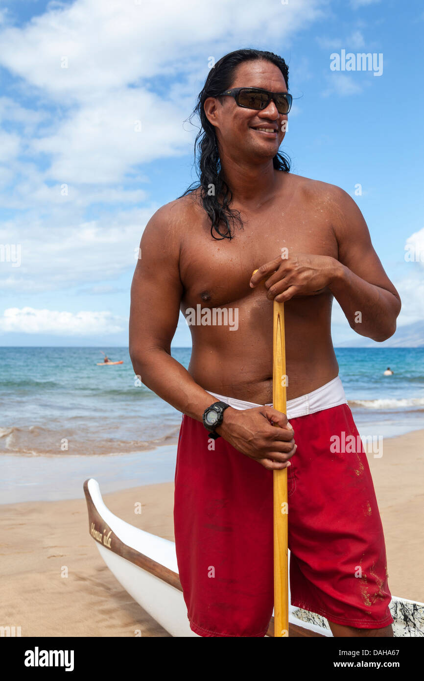 Outrigger canoe tour guide at Wailea Beach on Maui Stock Photo - Alamy