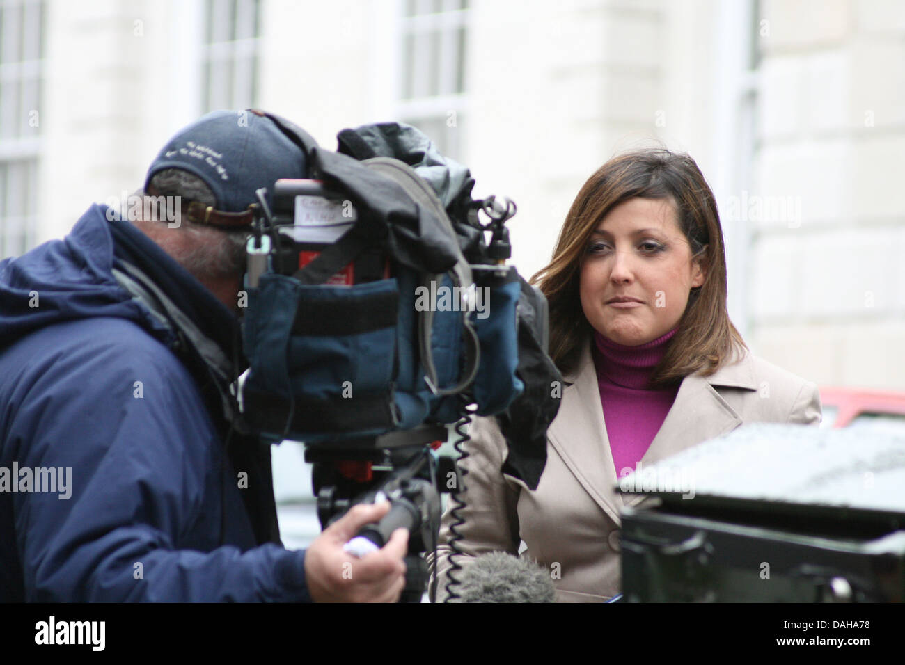 Television reporter being filmed during a murder trial Stock Photo - Alamy
