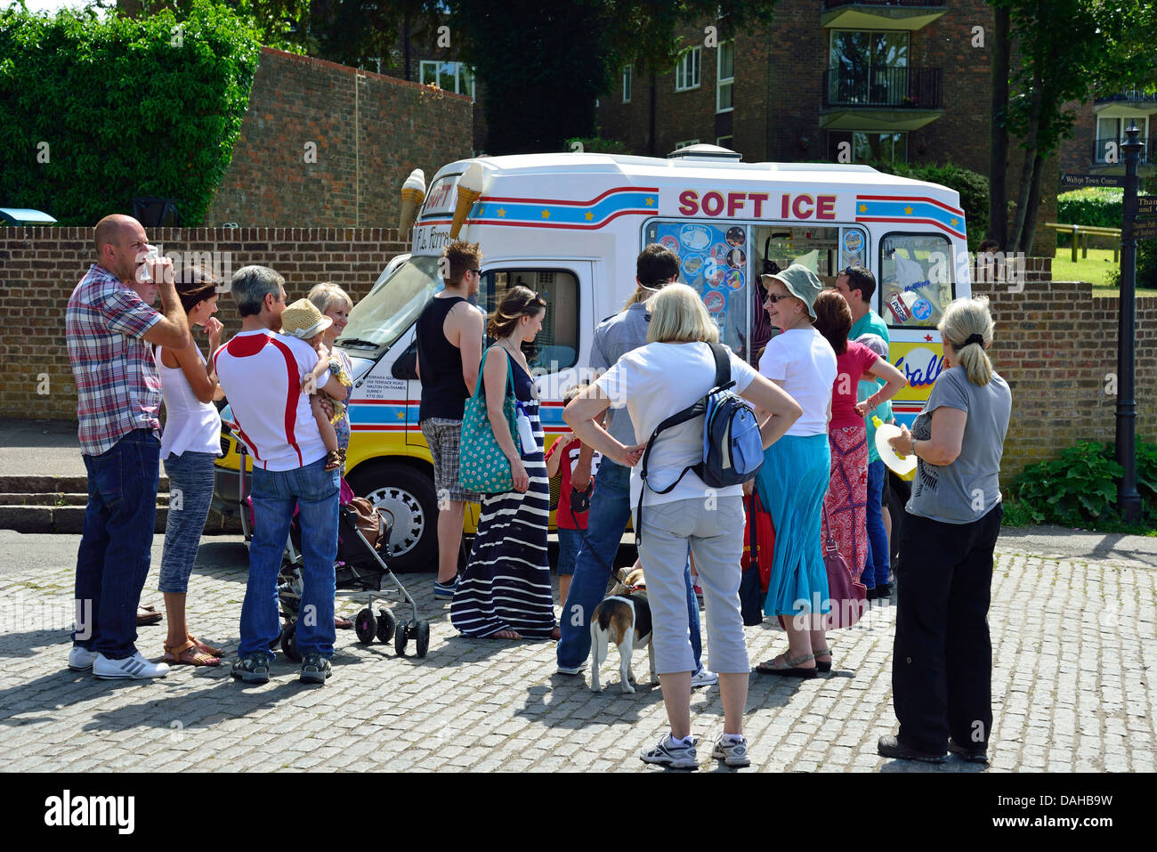 Queue for ice cream van on Thames riverside, Walton-on-Thames, Surrey ...