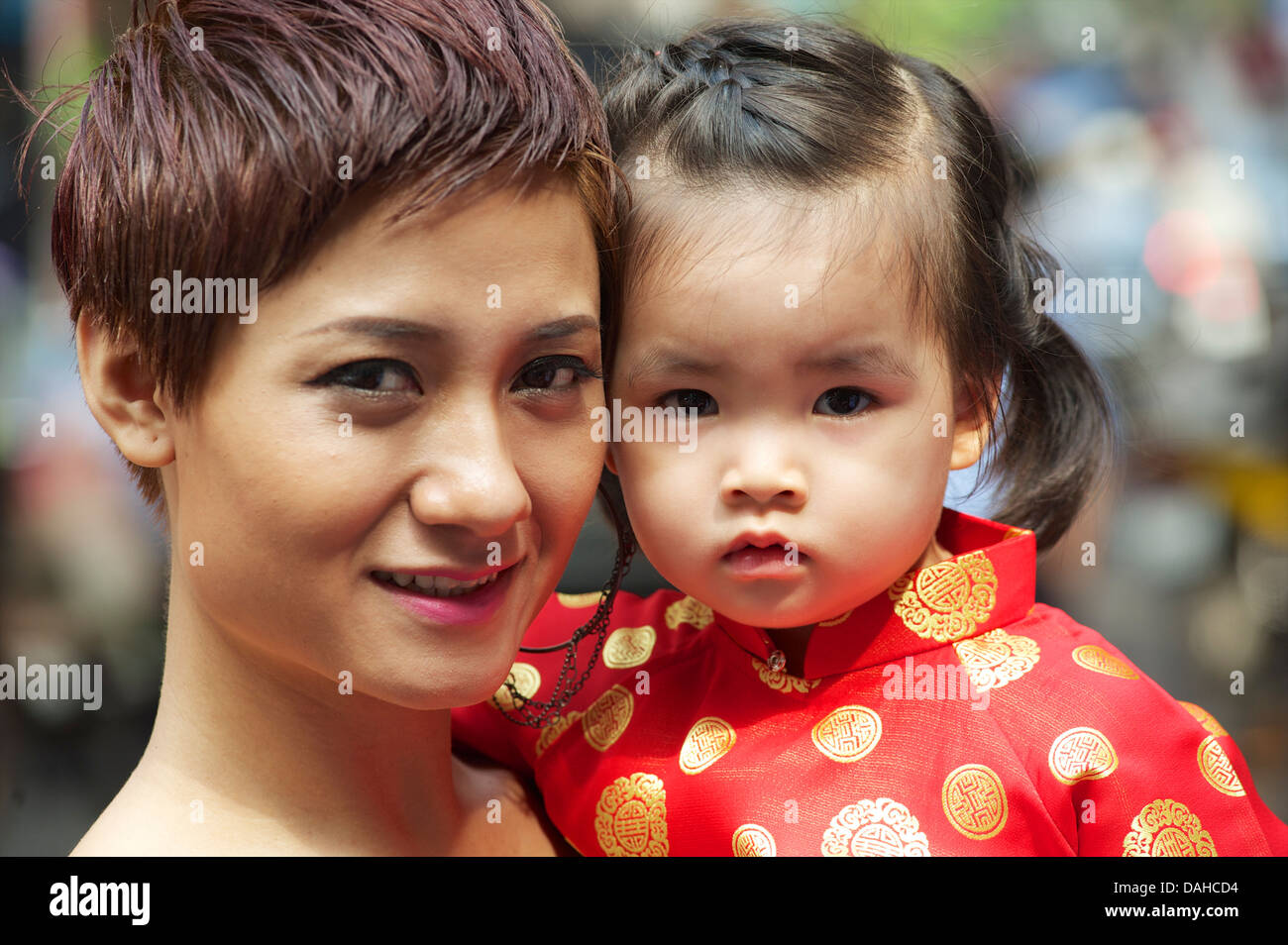 Vietnamese mother and young girl. Hanoi, Vietnam Stock Photo - Alamy