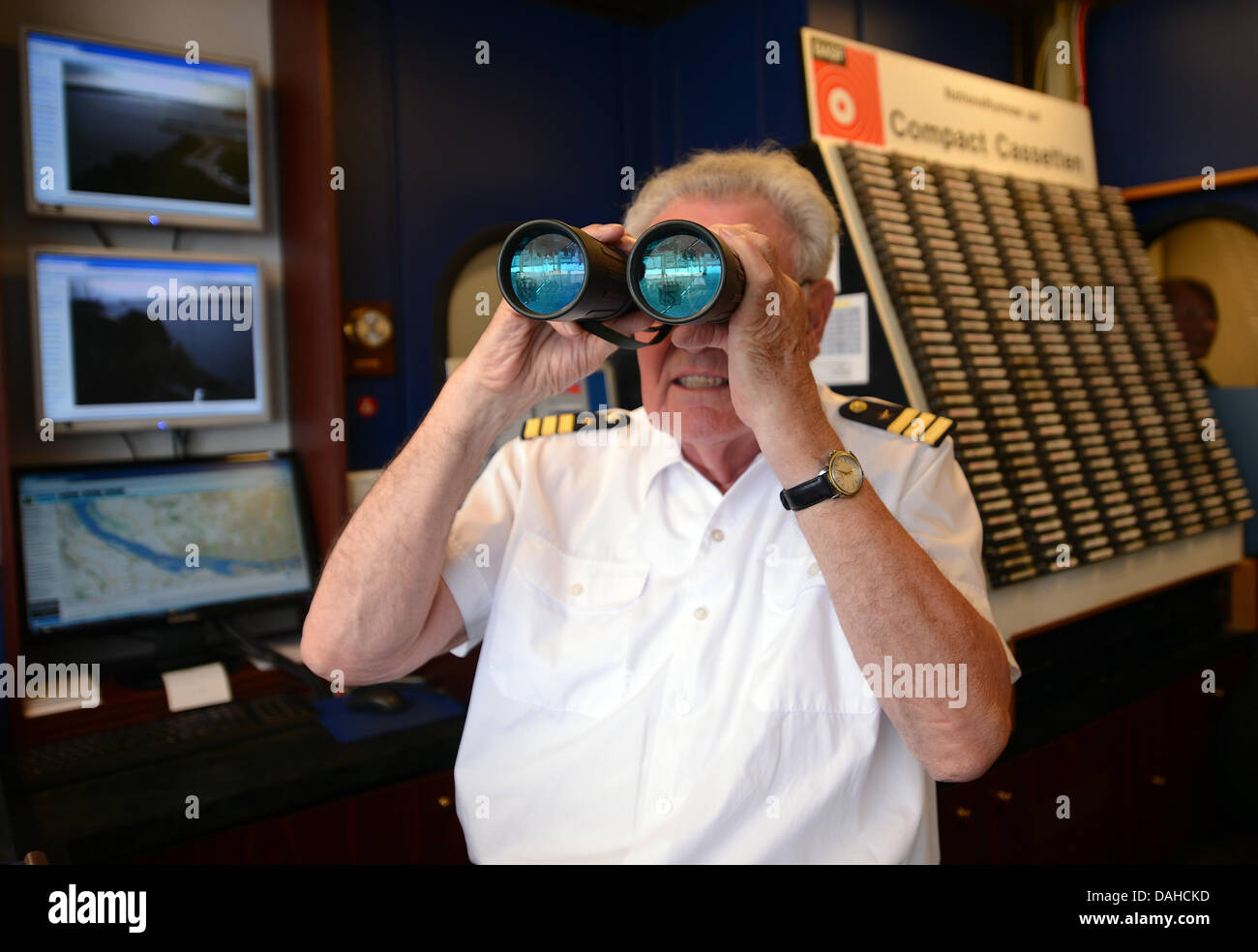 Wedel, Germany. 21st June, 2013. Greeting captain Uwe Christensen looks ...