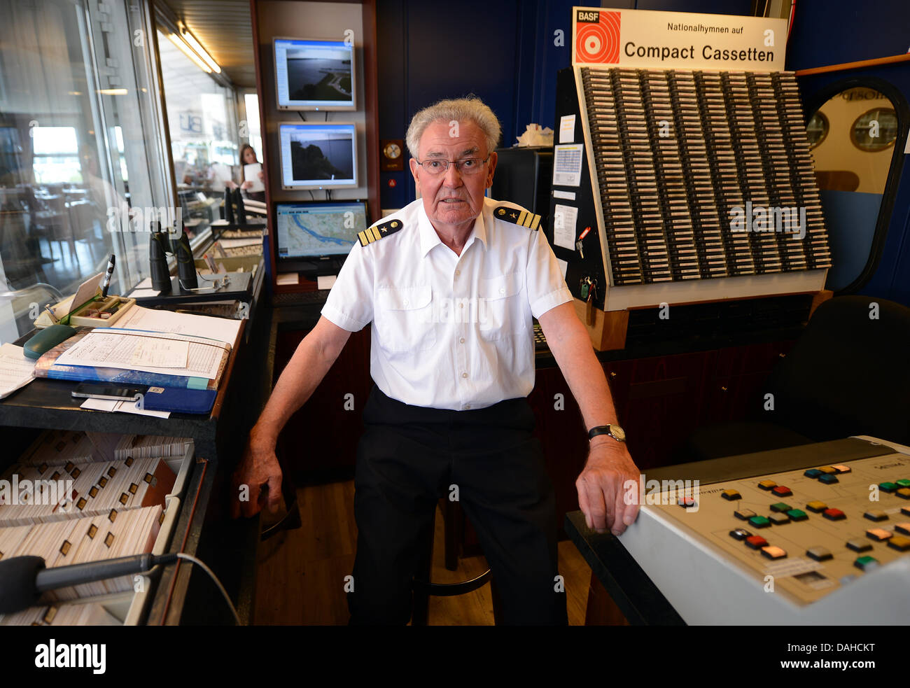 Wedel, Germany. 21st June, 2013. Greeting captain Uwe Christensen sits ...