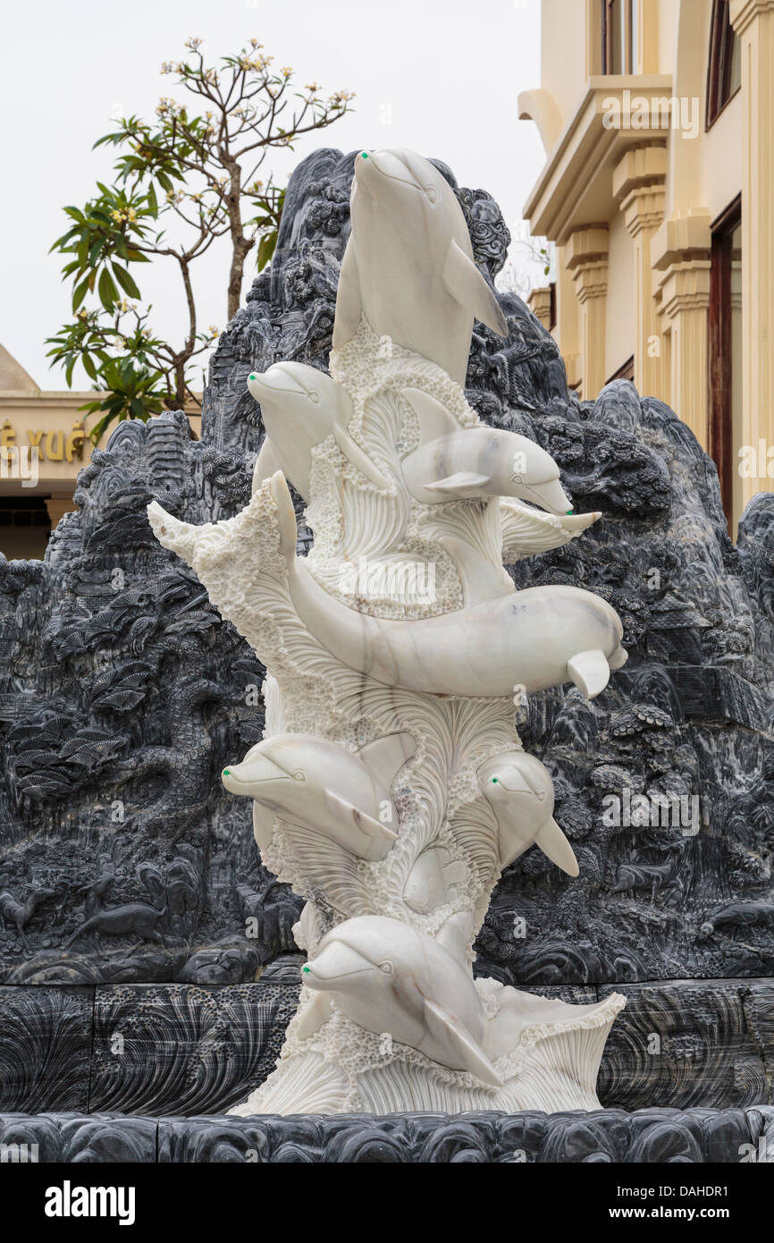 Stone dolphin sculptures at the Marble Factory in the Marble Mountains ...