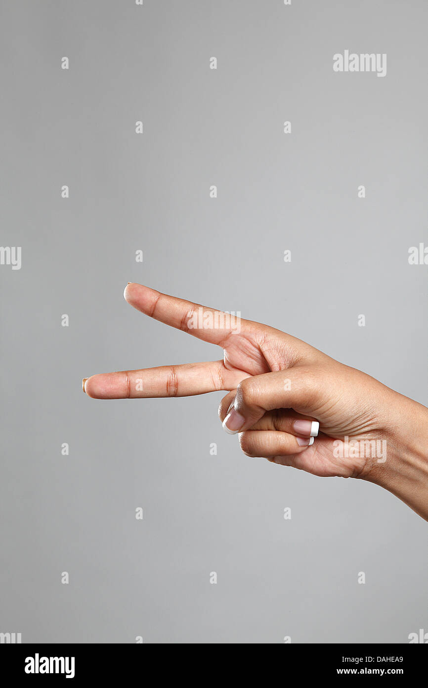 Woman's hand counting two Stock Photo - Alamy
