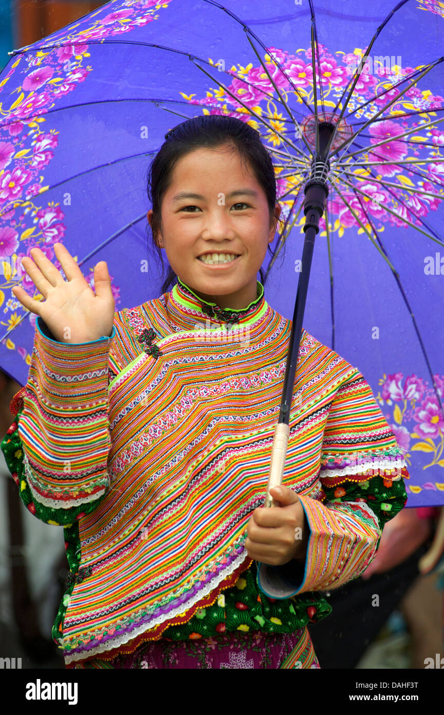 Vietnamese Flower Hmong girl with umbrella at Bac Ha market Stock Photo ...