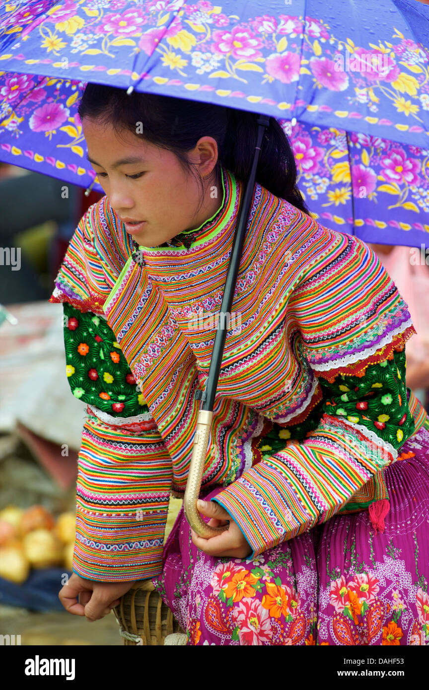 Vietnamese Flower Hmong girl with umbrella at Bac Ha market Stock Photo ...