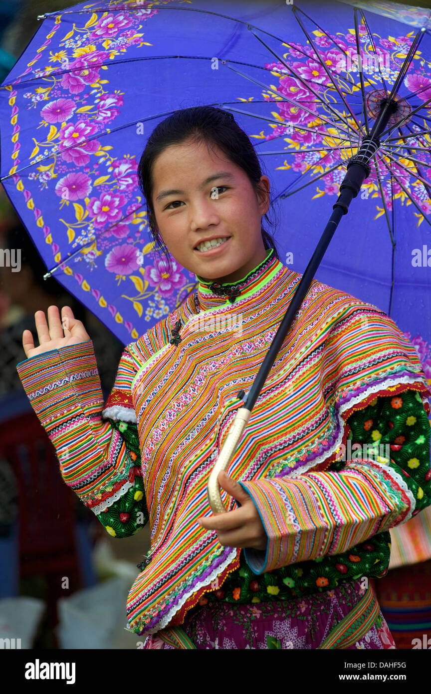 Vietnamese Flower Hmong girl with umbrella at Bac Ha market Stock Photo ...