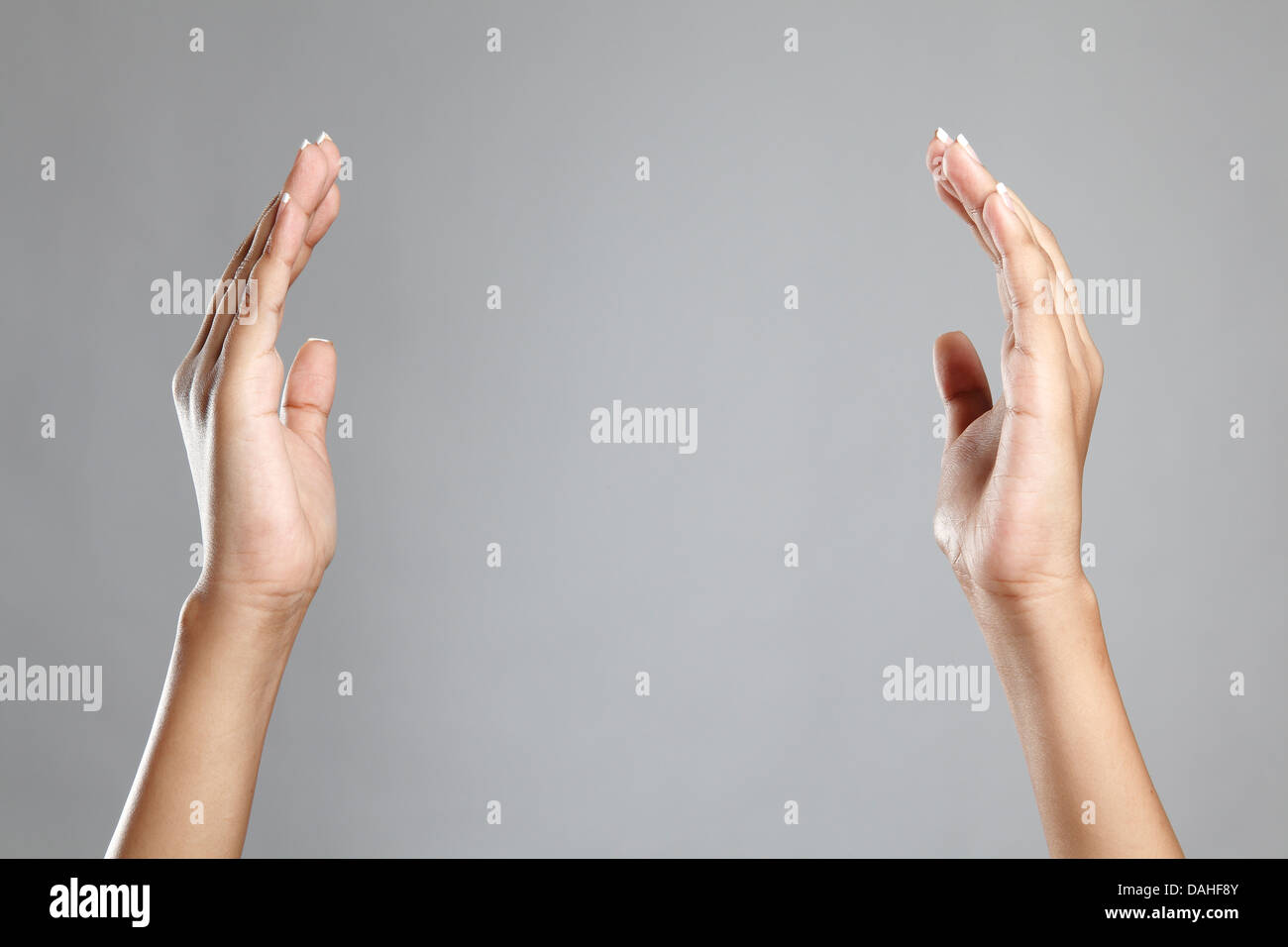 Woman's hands surrounding the space Stock Photo - Alamy