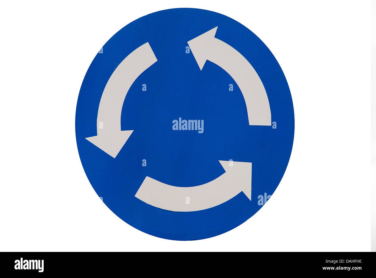 Road sign. Warning, roundabout on the way Stock Photo - Alamy