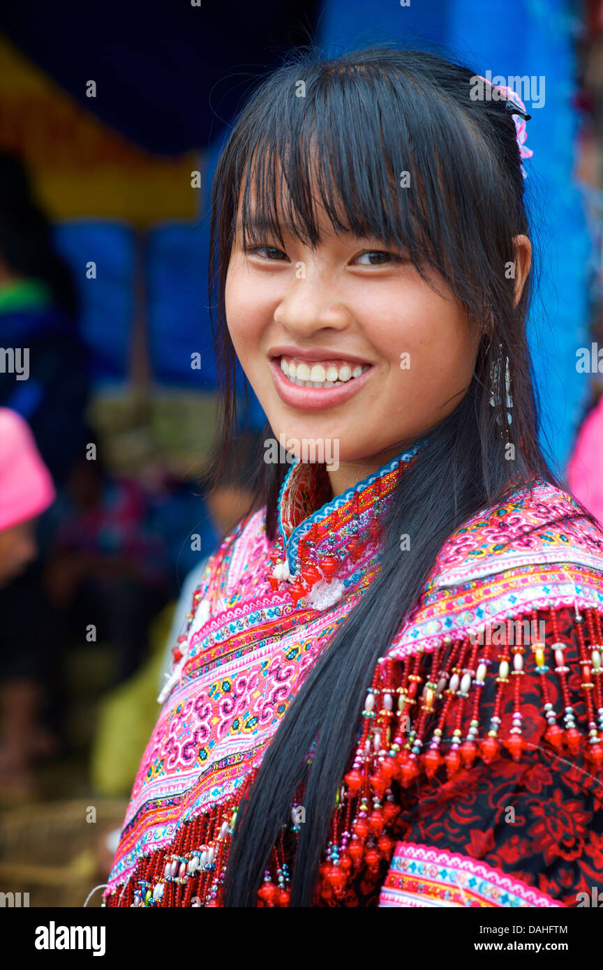 Portrait of a Flower Hmong woman in distinctive tribal costume, Bac Ha ...