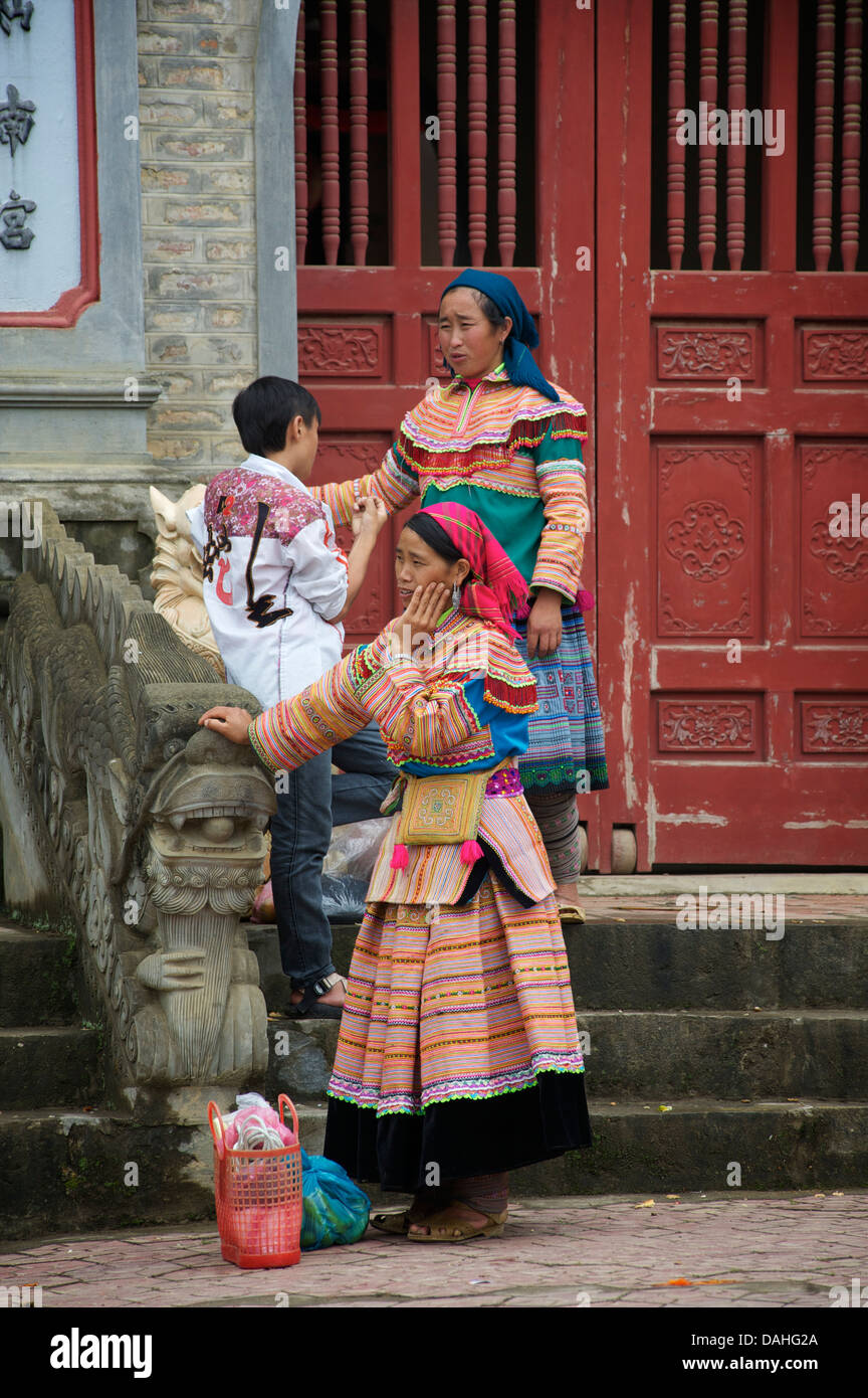 Hmong tribal community. Waiting outside the temple in Bac Ha, Lao Cai ...