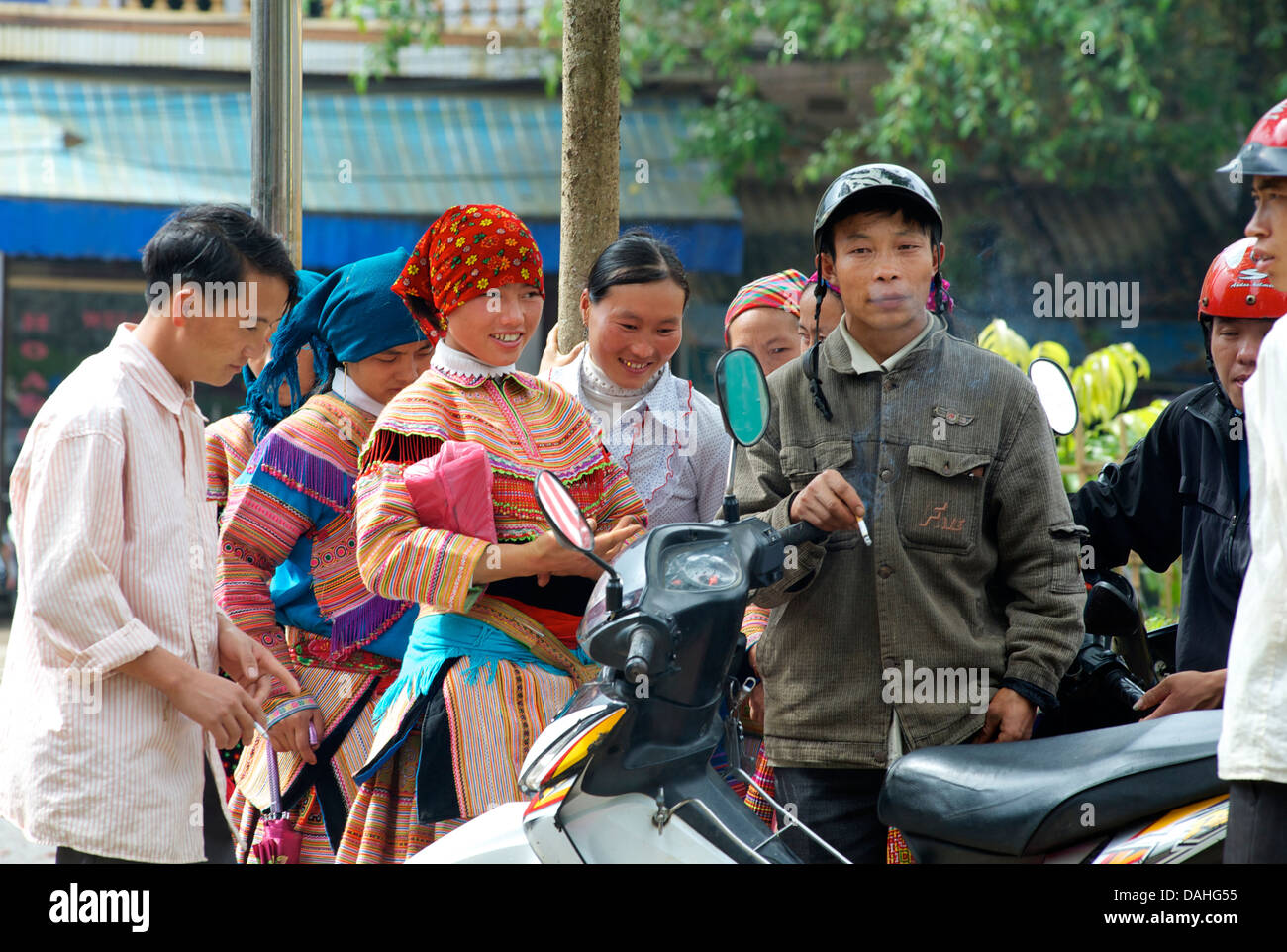 Group of Flower Hmong men and women in Bac Ha, Vietnam Stock Photo - Alamy