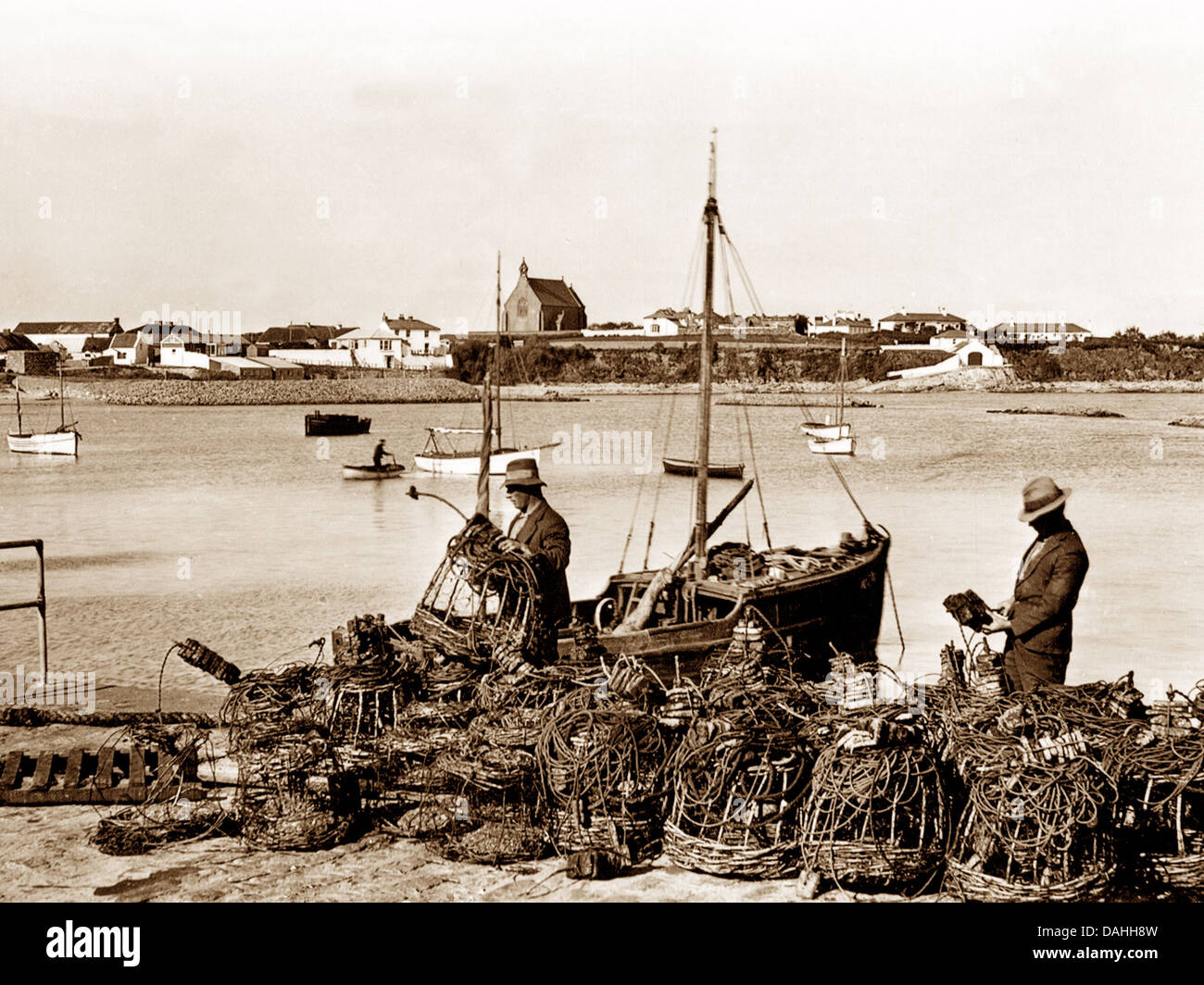 Early 1900s fishing hi-res stock photography and images - Alamy