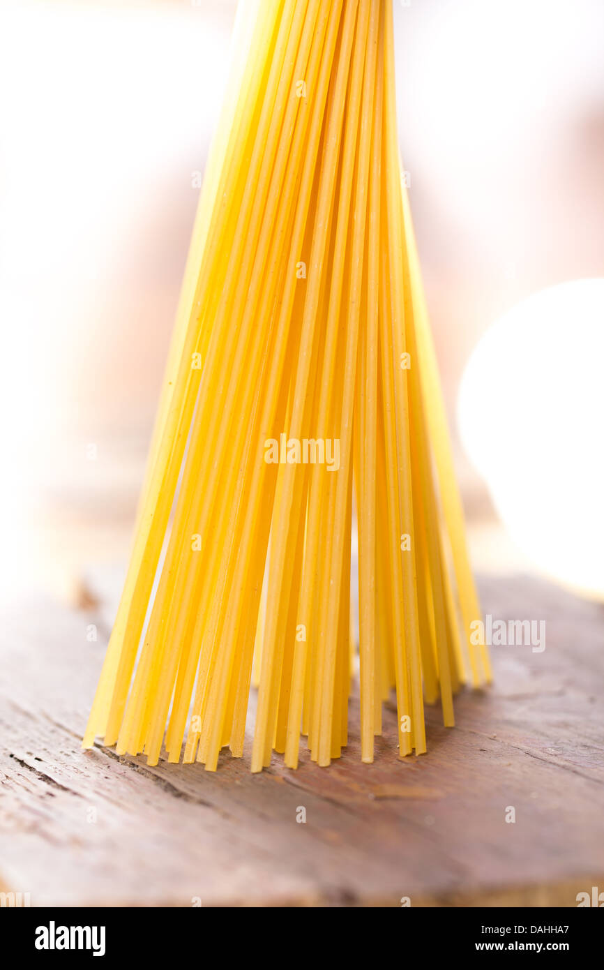 spaghetti on wooden table Stock Photo - Alamy