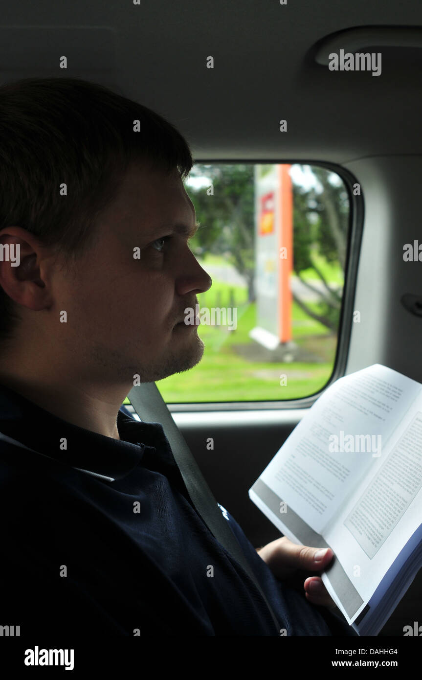 Car reading book hi-res stock photography and images - Alamy