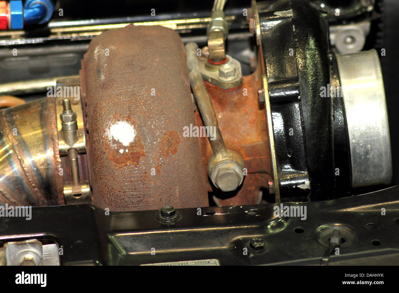 A Turbo engine under the hood race car Stock Photo - Alamy