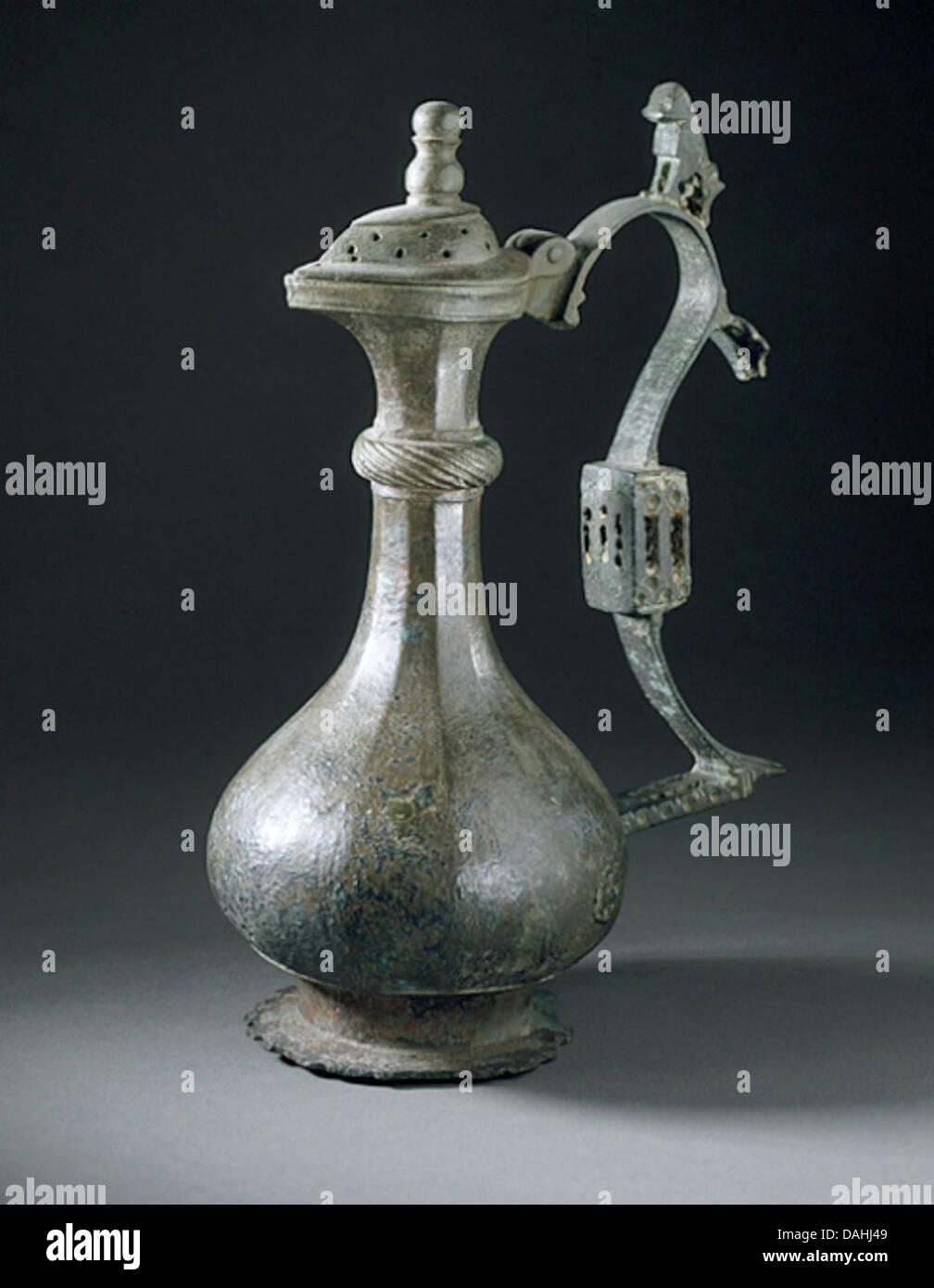This ewer is an example of ancient craftsmanship, designed for holding ...