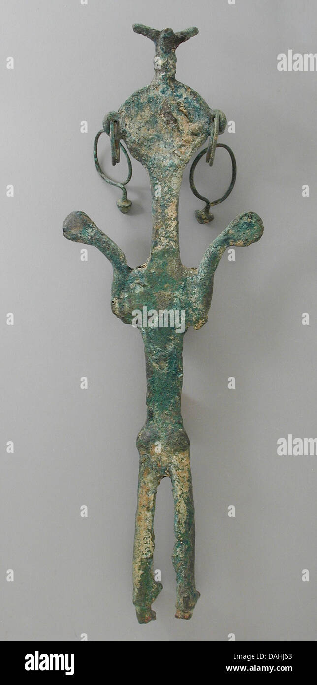 This sculpture of a female figure represents a stylized human form ...