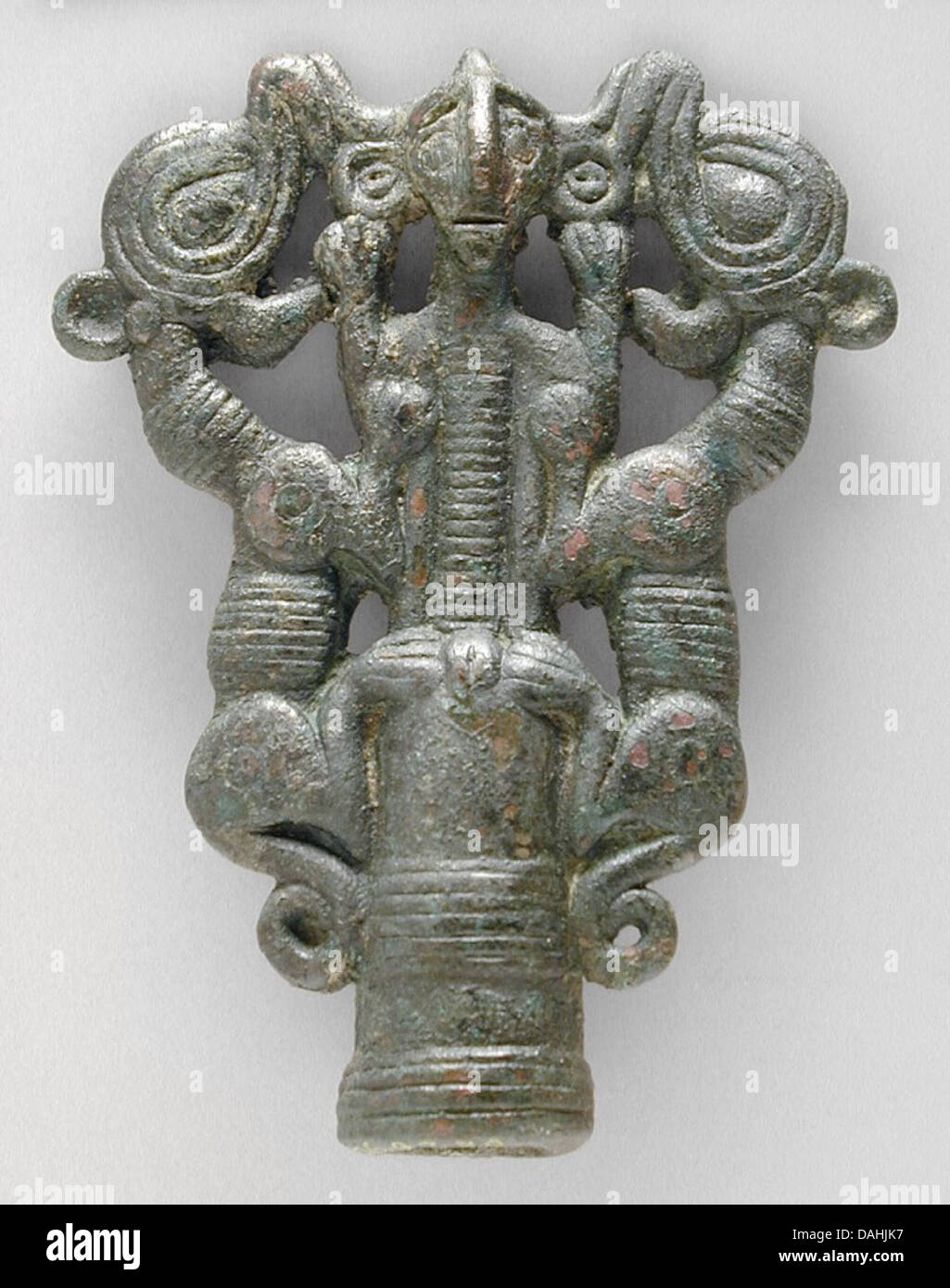 This finial or socket piece is a bronze, cast object from the Los ...