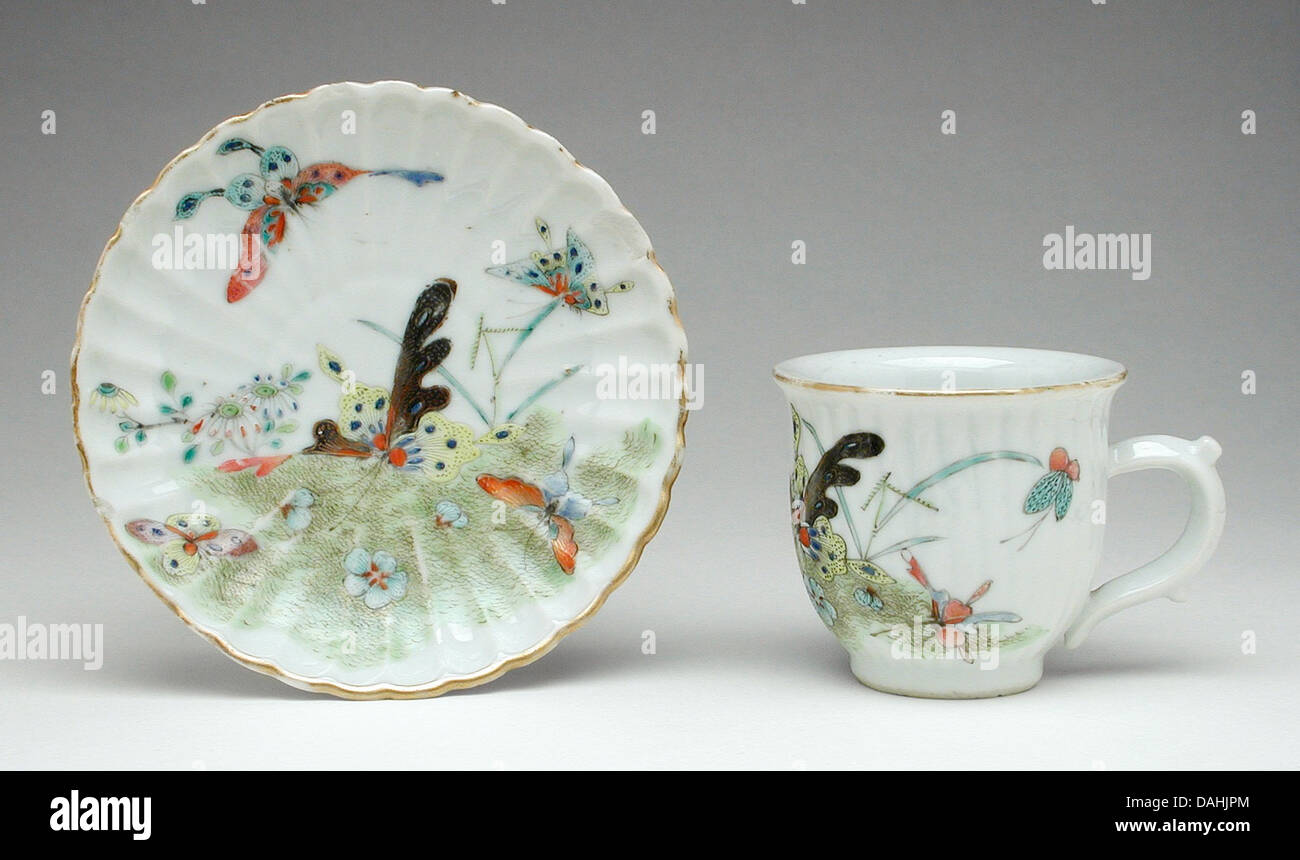 This fluted cup and saucer set is crafted from porcelain, showcasing ...