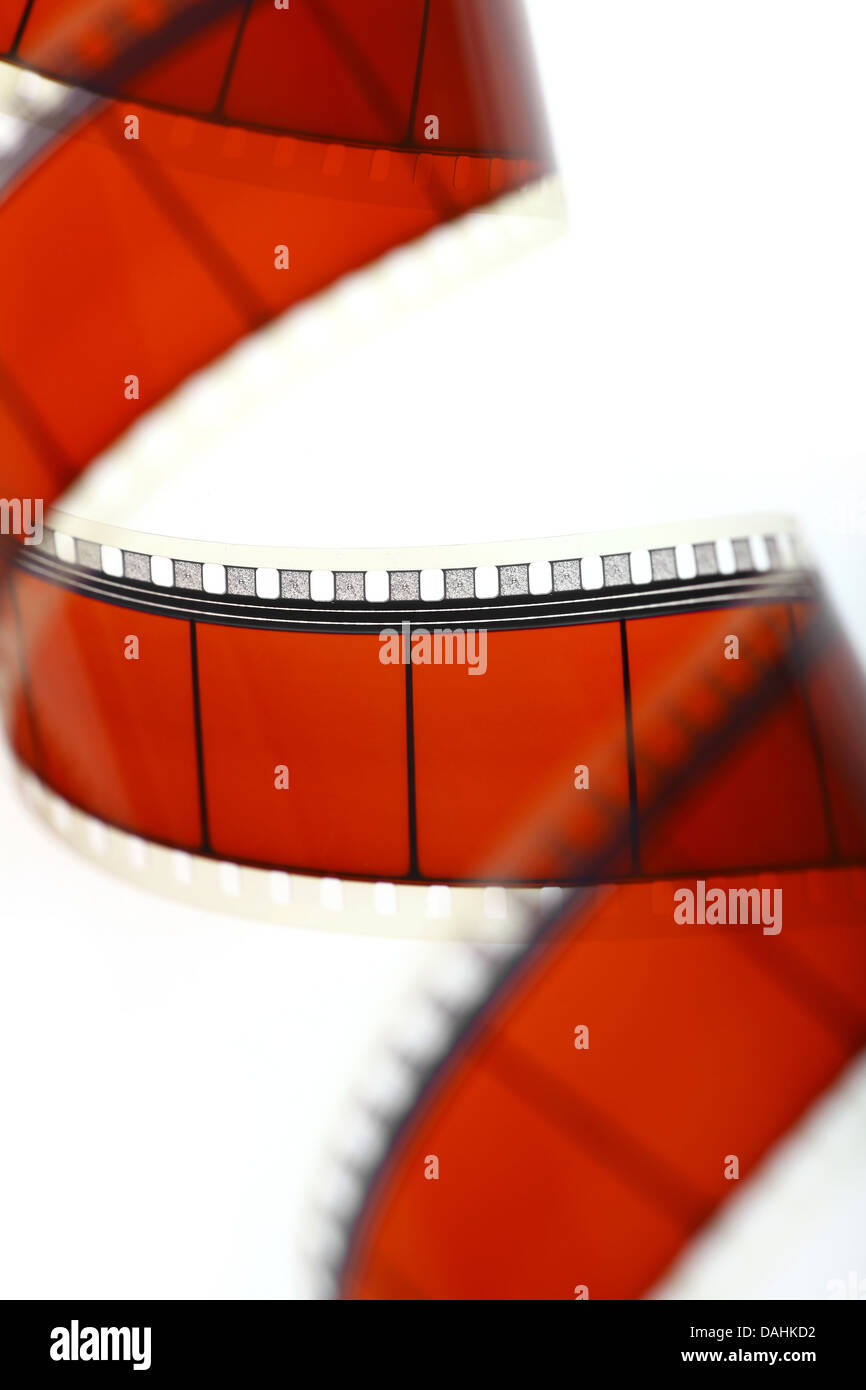 Detail of a red movie film isolated on white Stock Photo - Alamy