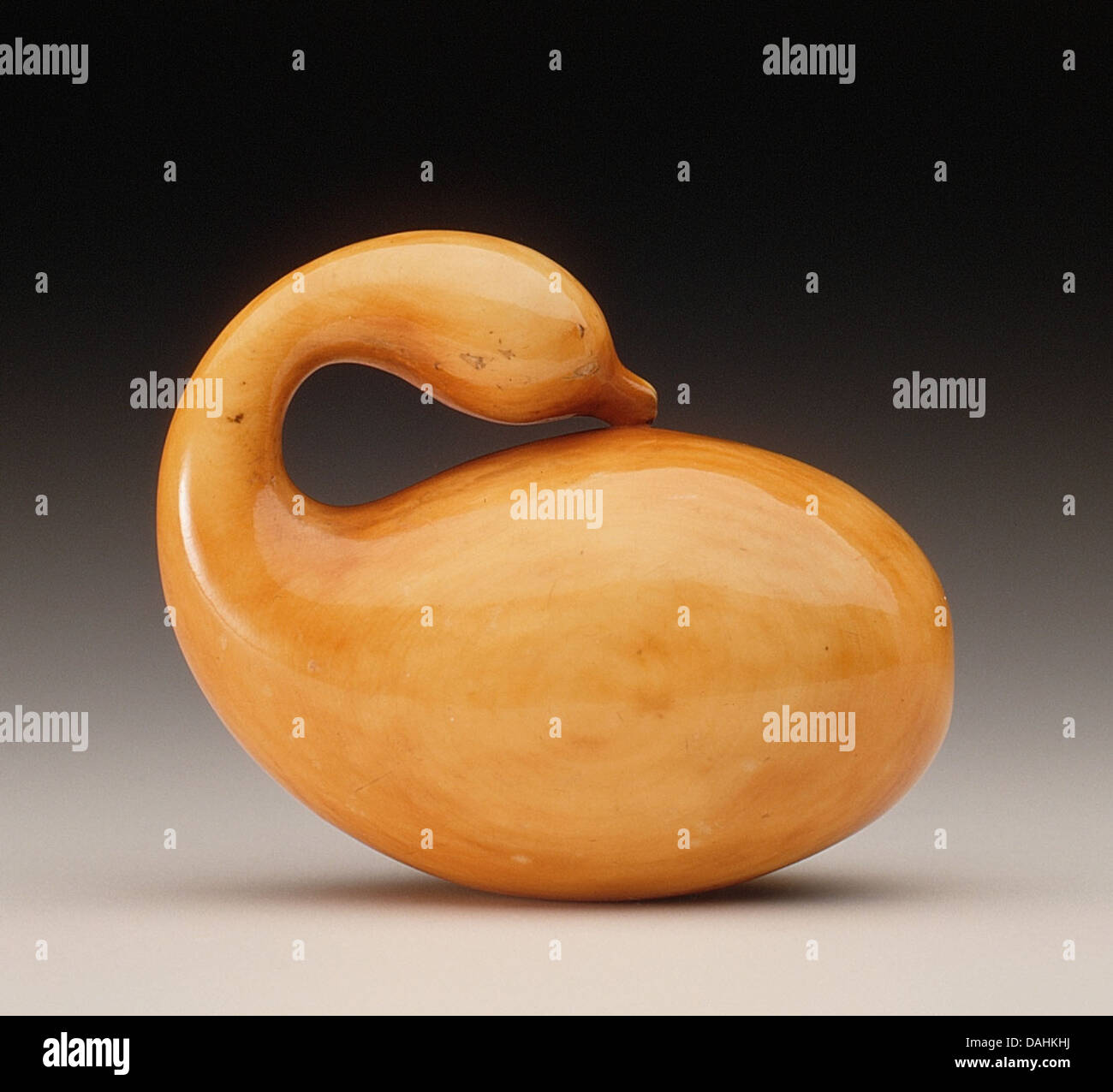 A gooseneck gourd, an example of functional and artistic craftsmanship ...