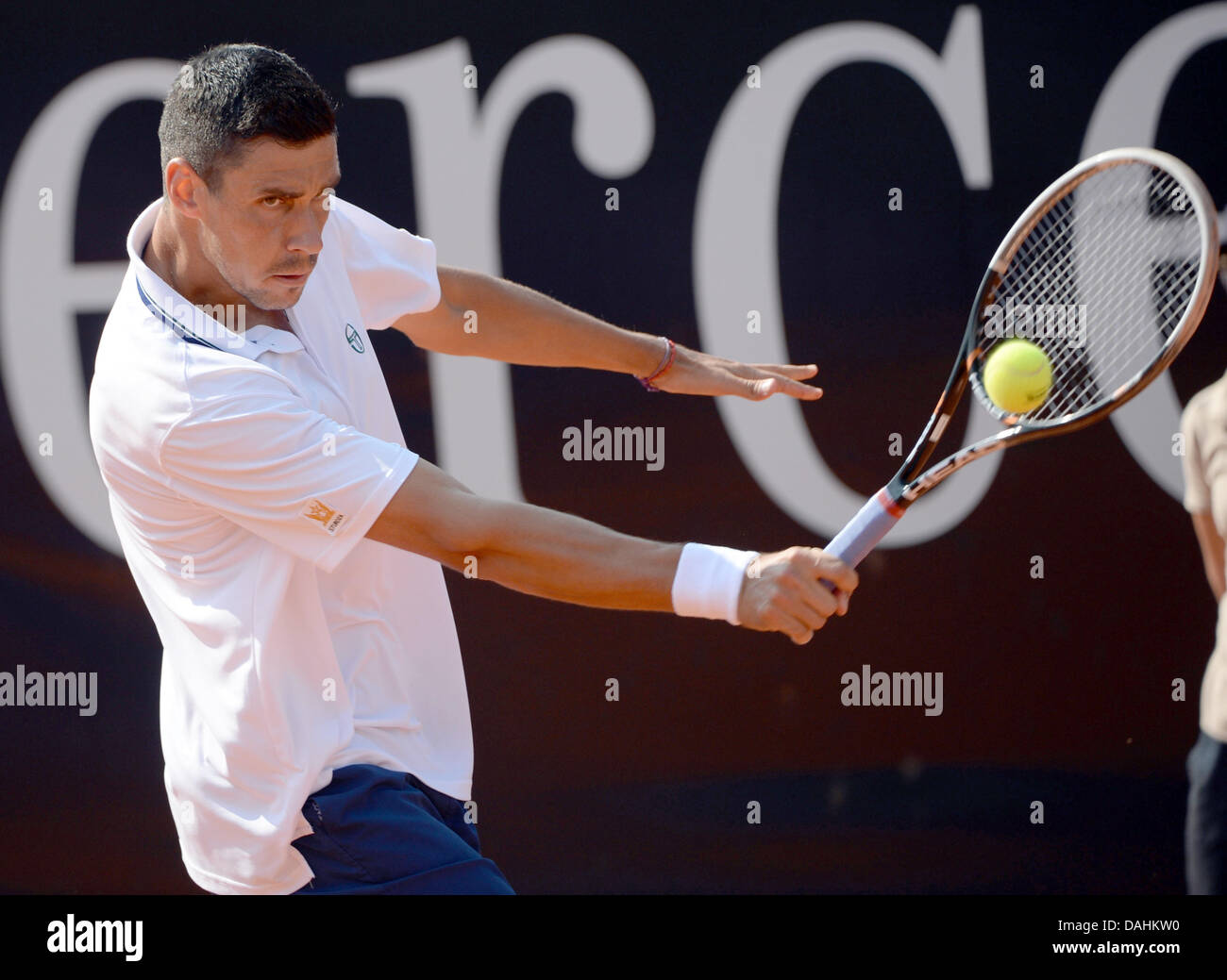 Stuttgart, Germany. 13th July, 2013. Romania's Victor Hanescu returns ...
