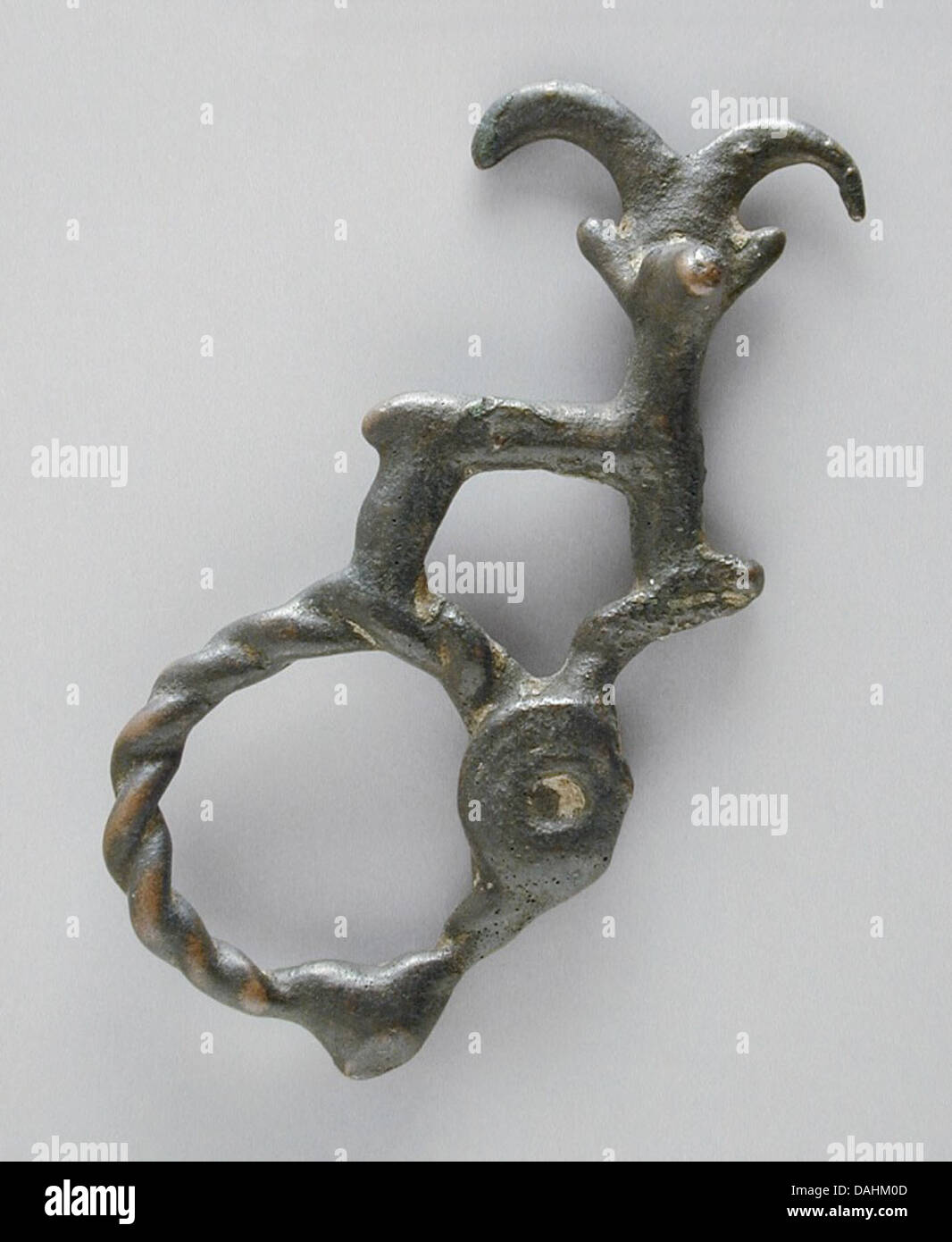 This bronze harness ring, used in ancient horse or chariot gear ...