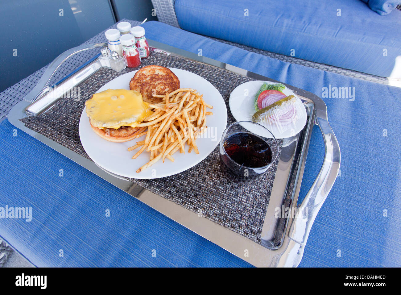 Burger, Egg and fries on a room service tray in a luxury hotel Stock ...