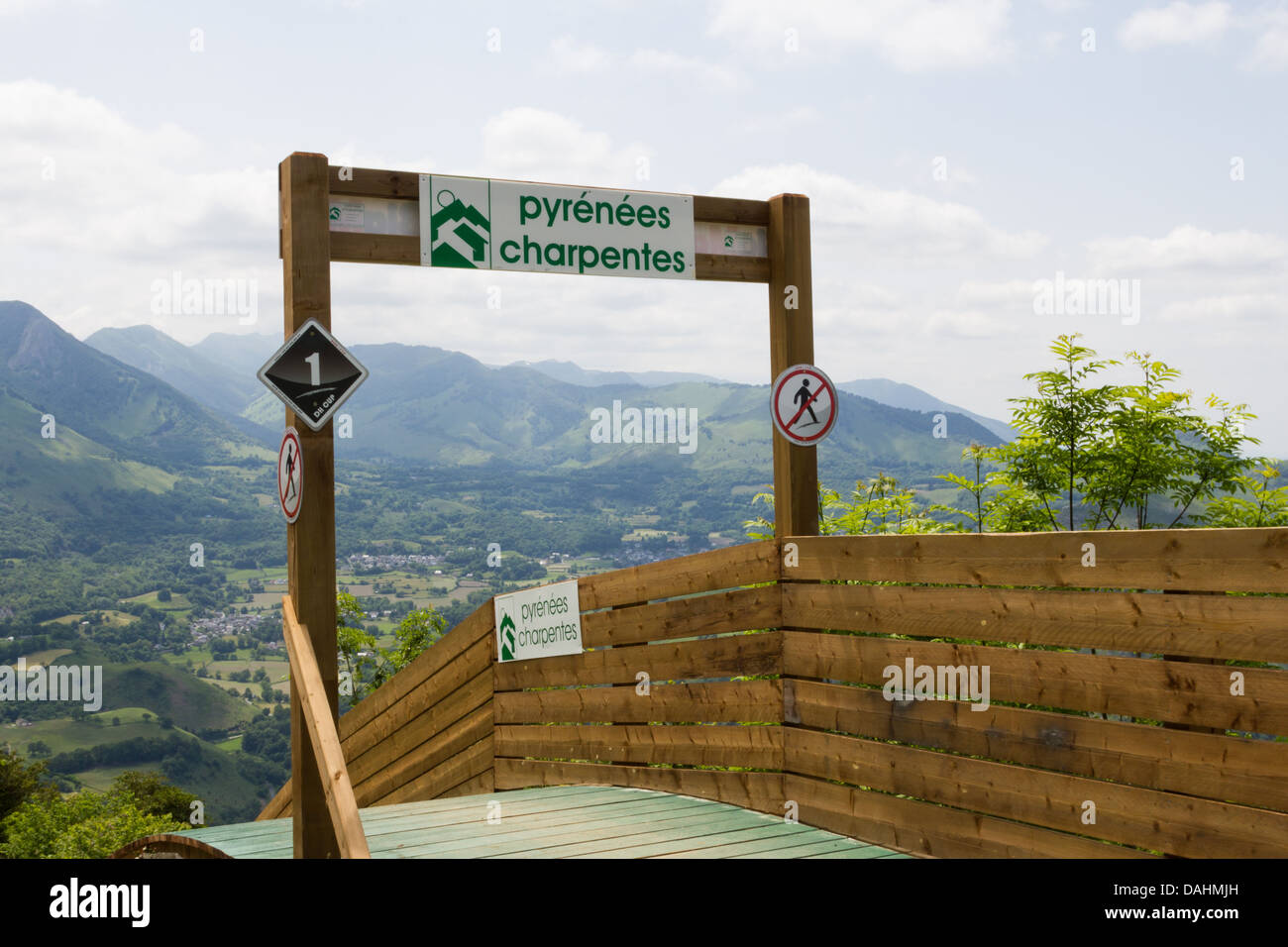 Mountain bike route start gate above Lourdes Stock Photo - Alamy