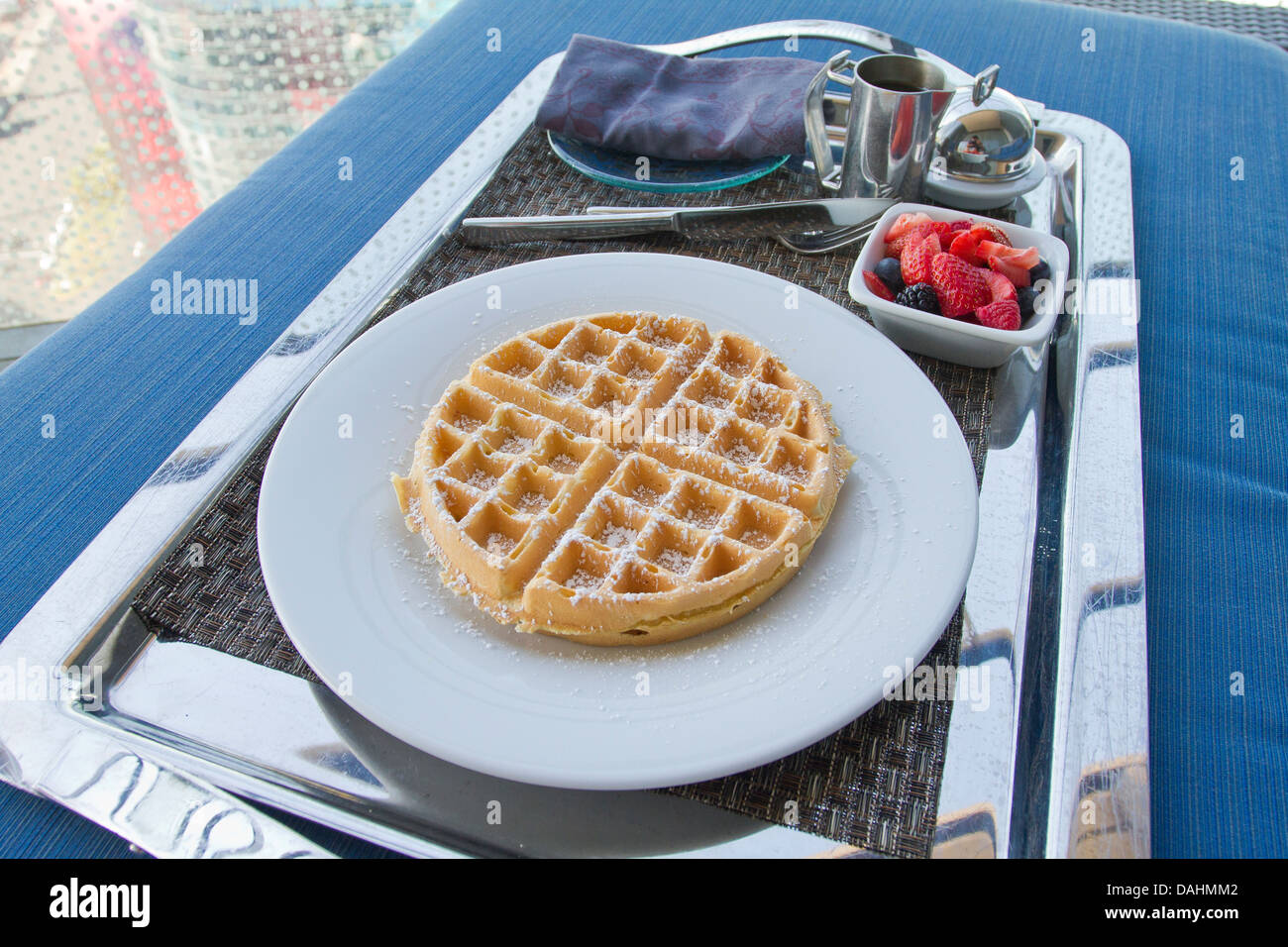 Waffles on a room service tray in a luxury hotel Stock Photo - Alamy