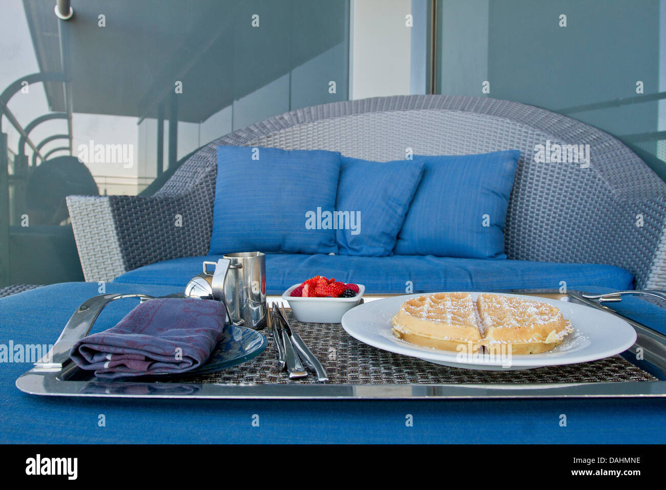 Waffles on a room service tray in a luxury hotel Stock Photo - Alamy