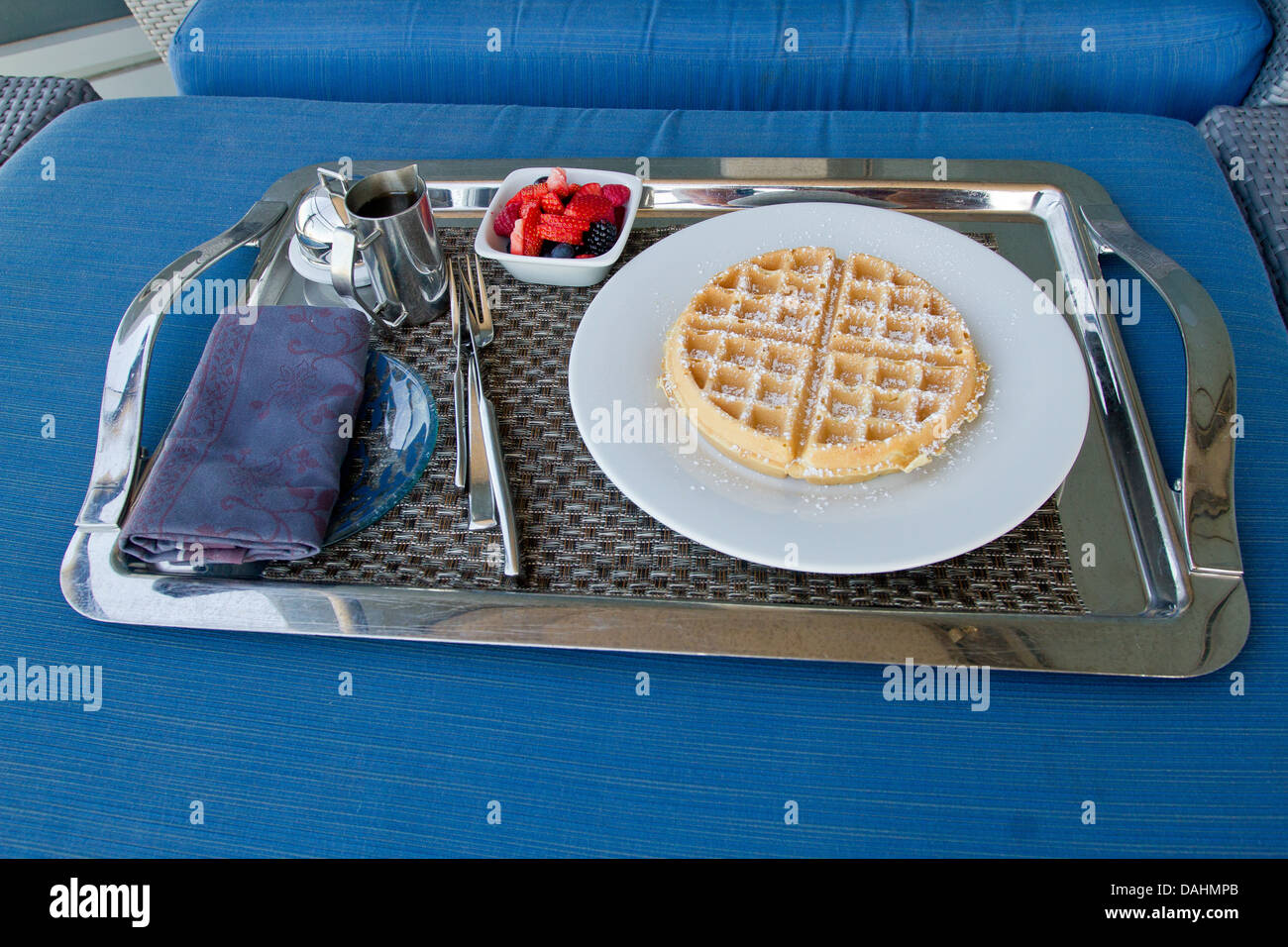 Waffles on a room service tray in a luxury hotel Stock Photo - Alamy
