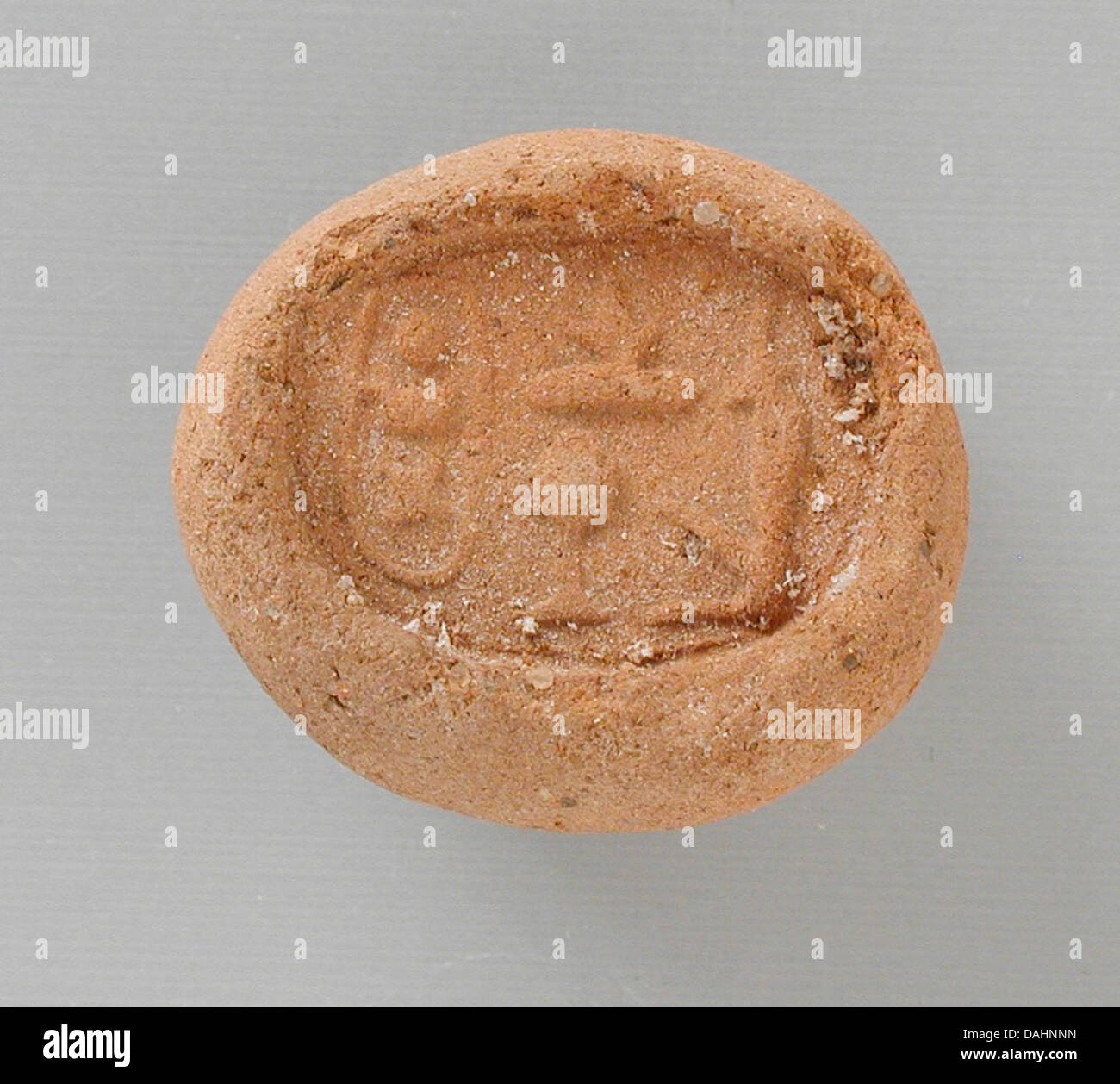 This bronze mold features the throne name of Thutmose III, an Egyptian ...