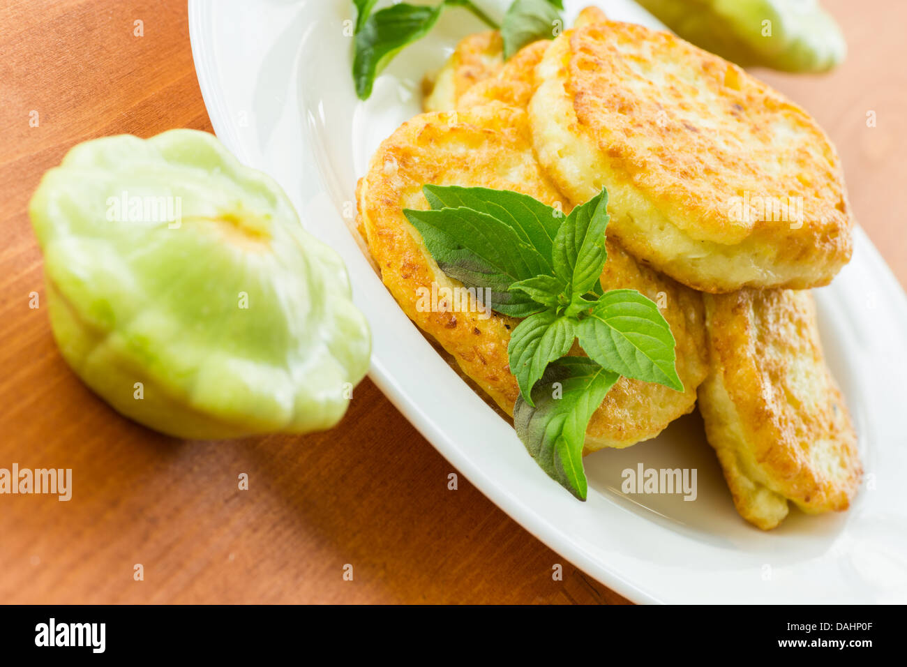Squash zucchini fritters on hi-res stock photography and images - Alamy