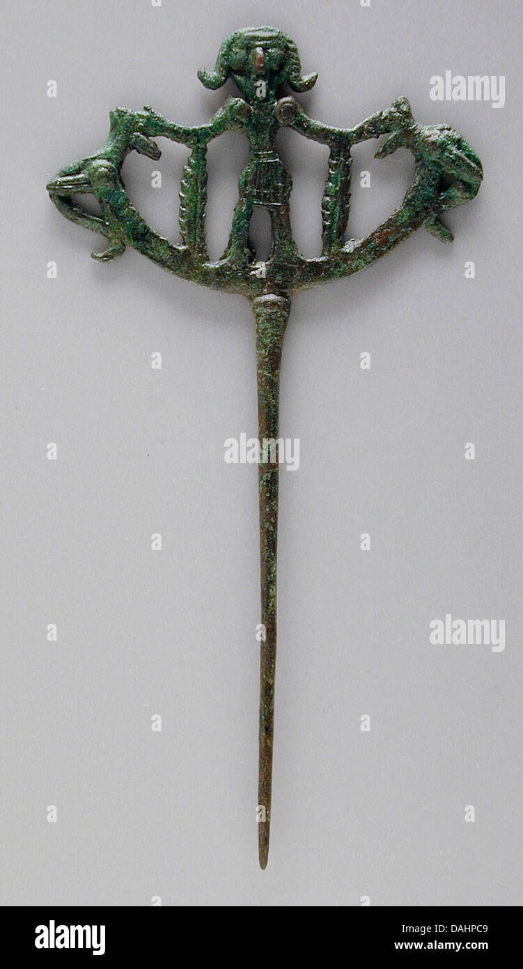 This openwork pin is a delicate example of intricate design and fine ...